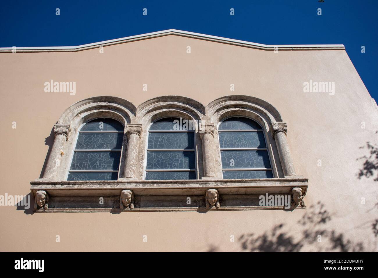 window of a church with beautiful architecture and champagne color ...