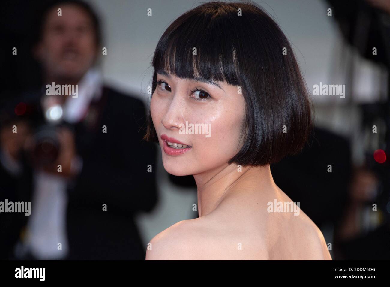 Huang Xiangli attending the Saturday Fiction Premiere as part of the ...