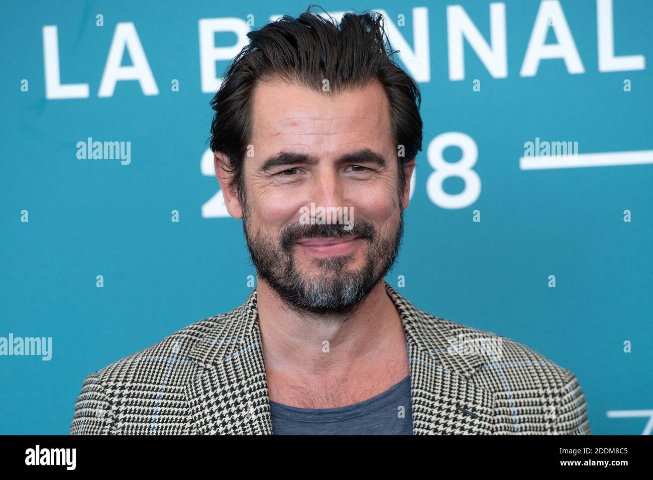 Claes Bang attending The Burnt Orange Heresy Photocall as part of the ...