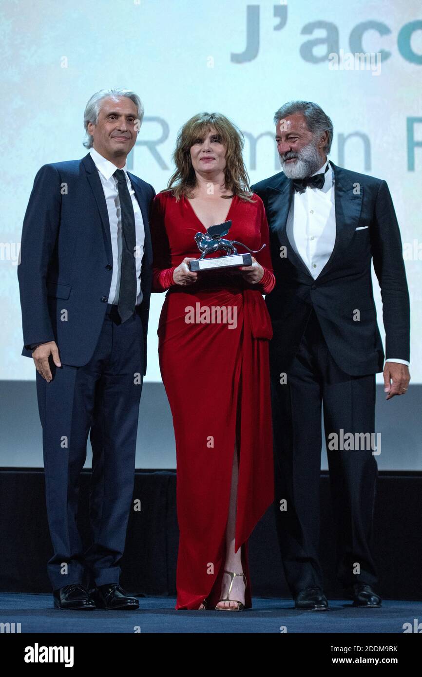 Alain Goldman, Luca Barbareschi and Emmanuelle Seigner receive the ...