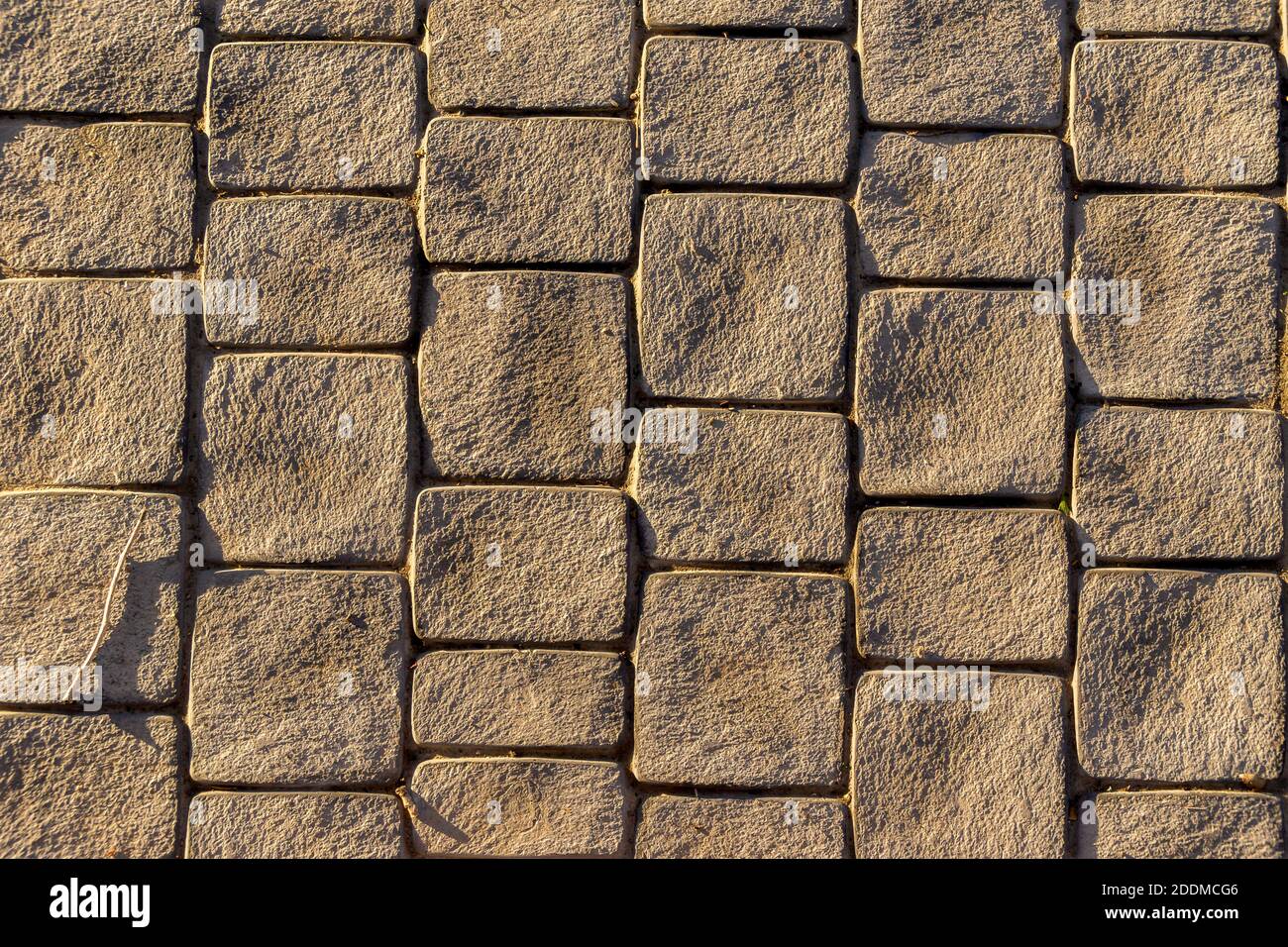 yellow stone paved surface, vertical direction with side light Stock ...