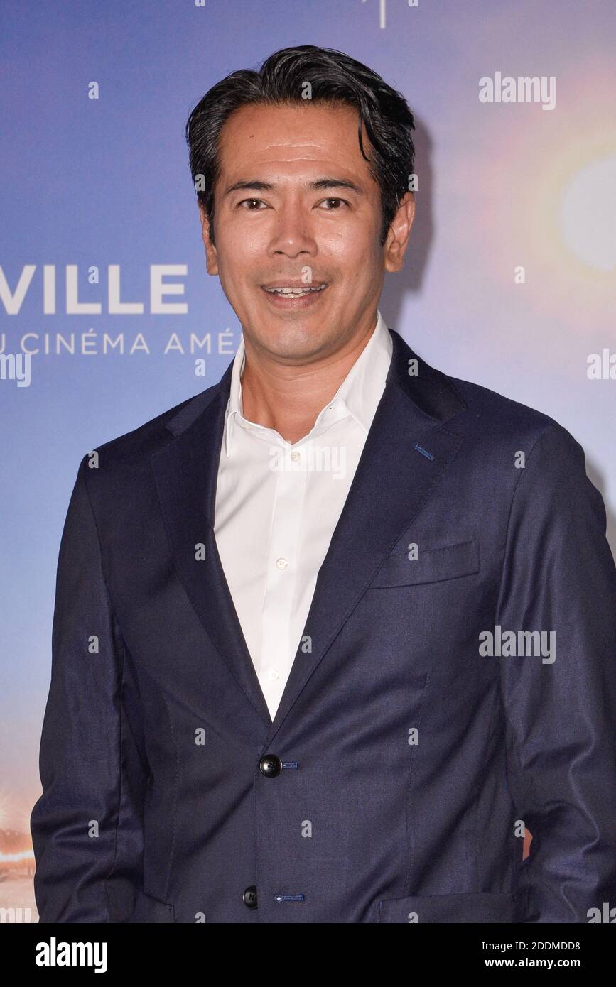 Jake Macapagal attending a photocall for the movie Watch List during ...