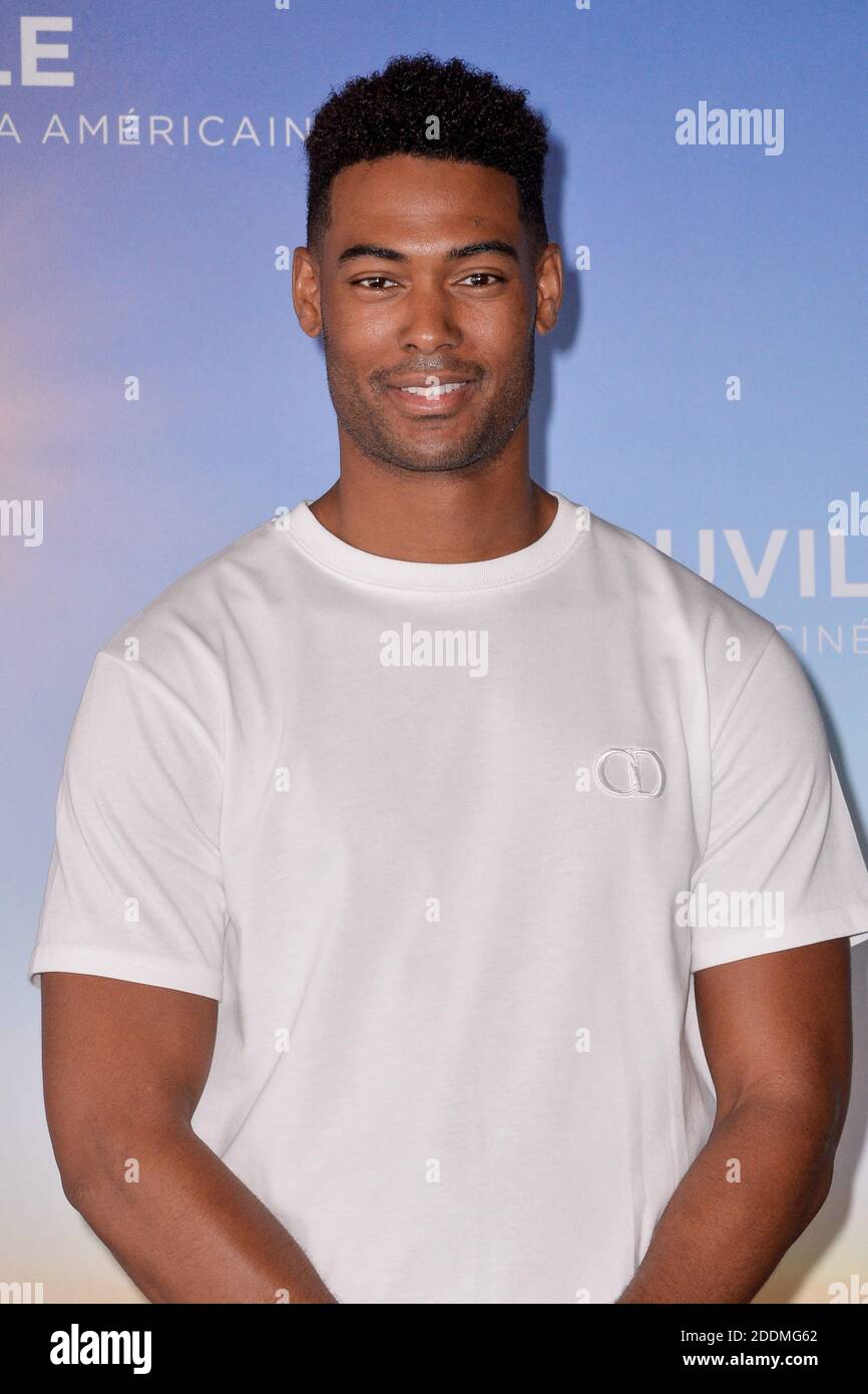 Djebril Zonga attending a photocall for the movie Les Miserables during ...