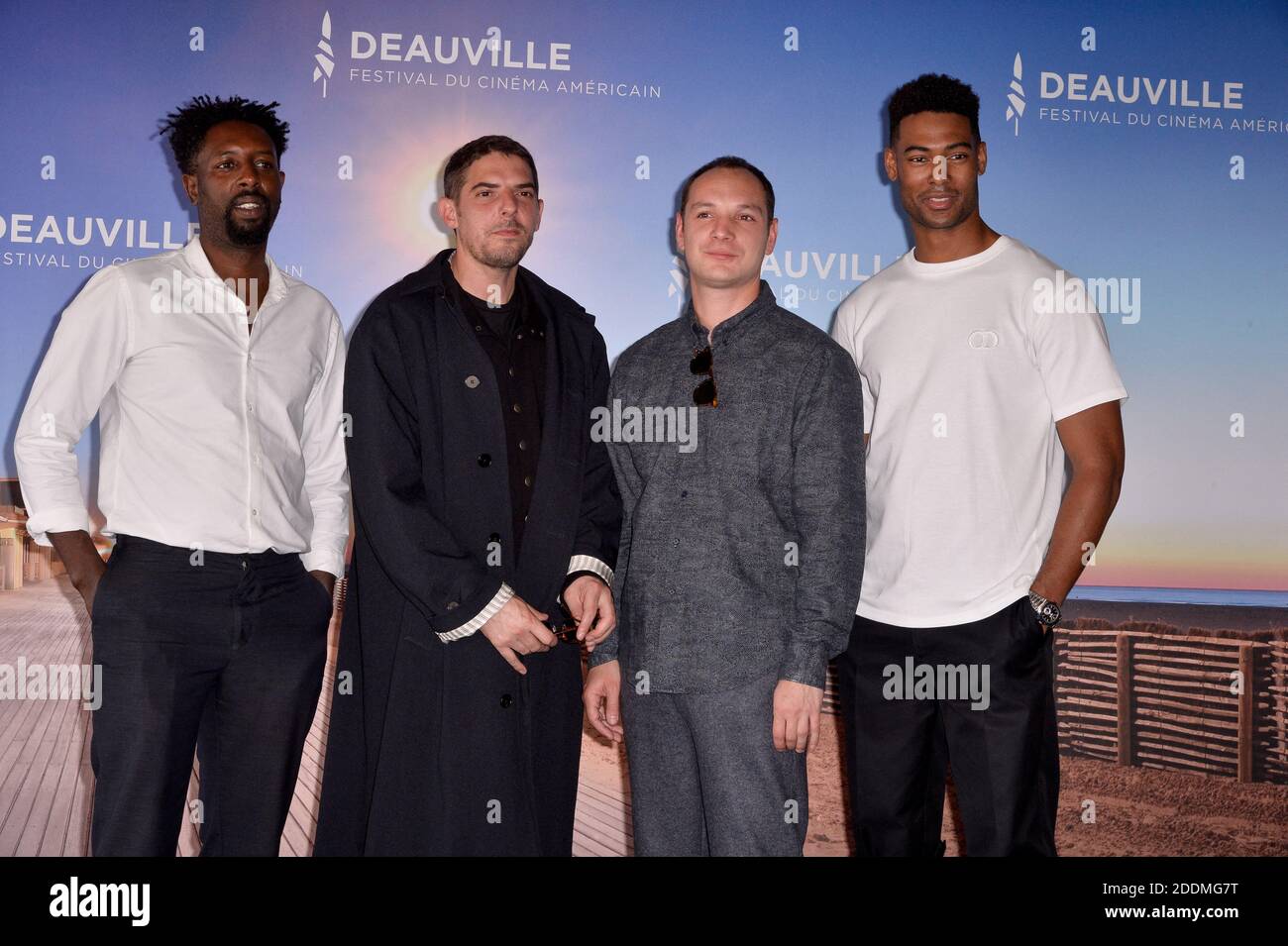 Ladj Ly, Damien Bonnard, Alexis Menenti, Djebril Zonga attending a ...