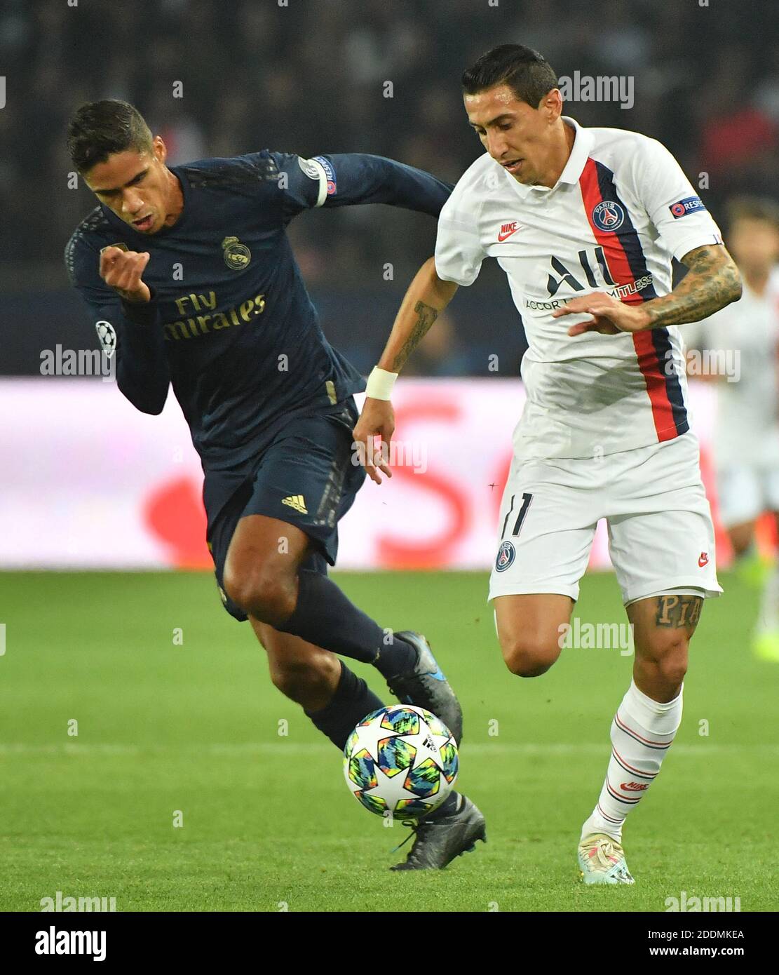 Real’s Raphael Varane and PSG's Angel Di Maria during the UEFA ...