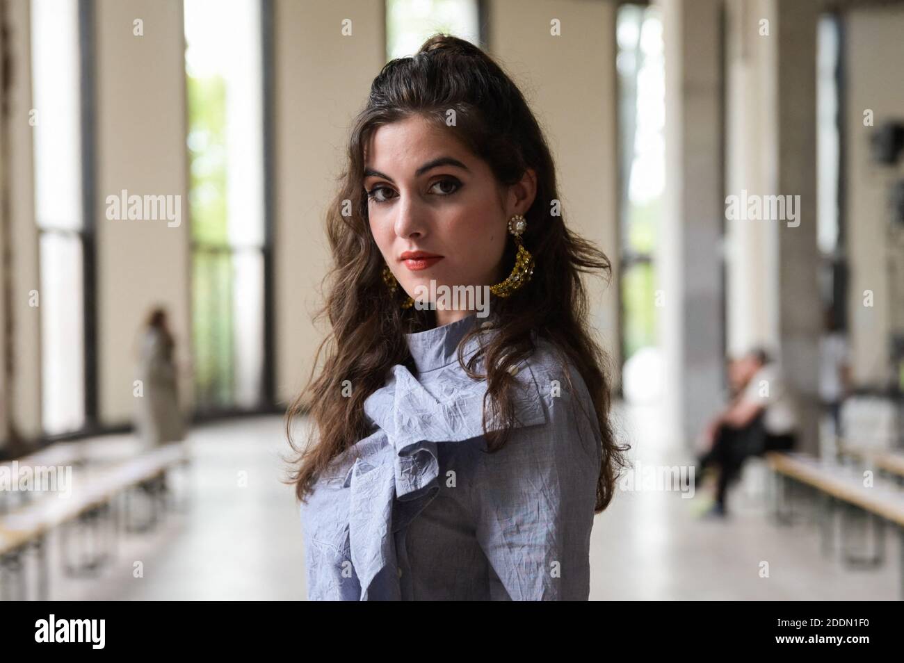 French actress Claire Chust poses before the runway during the Dawei ...