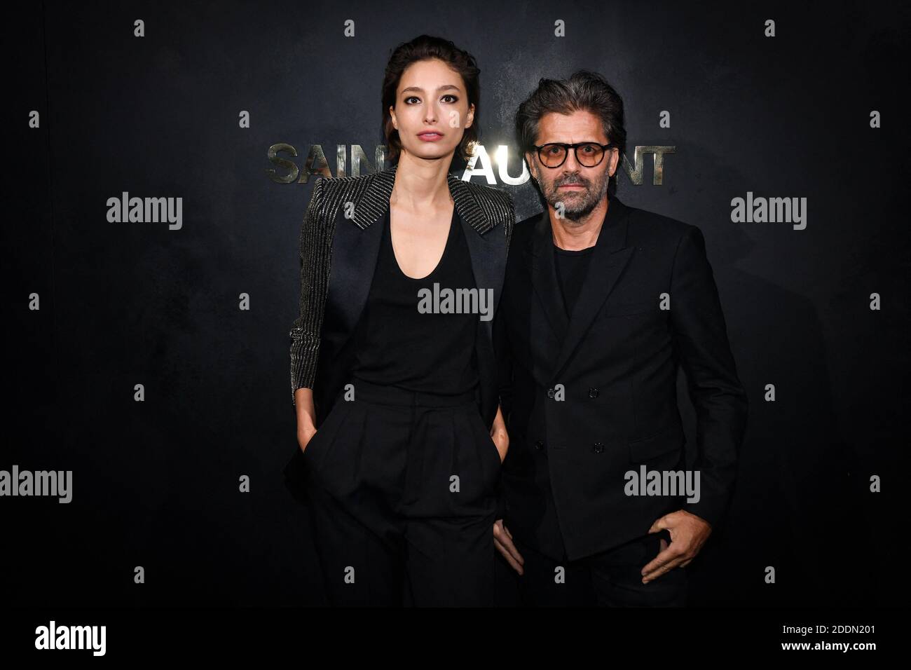 Alexadra Agoston and Chris Colls attends the Saint Laurent Womenswear ...