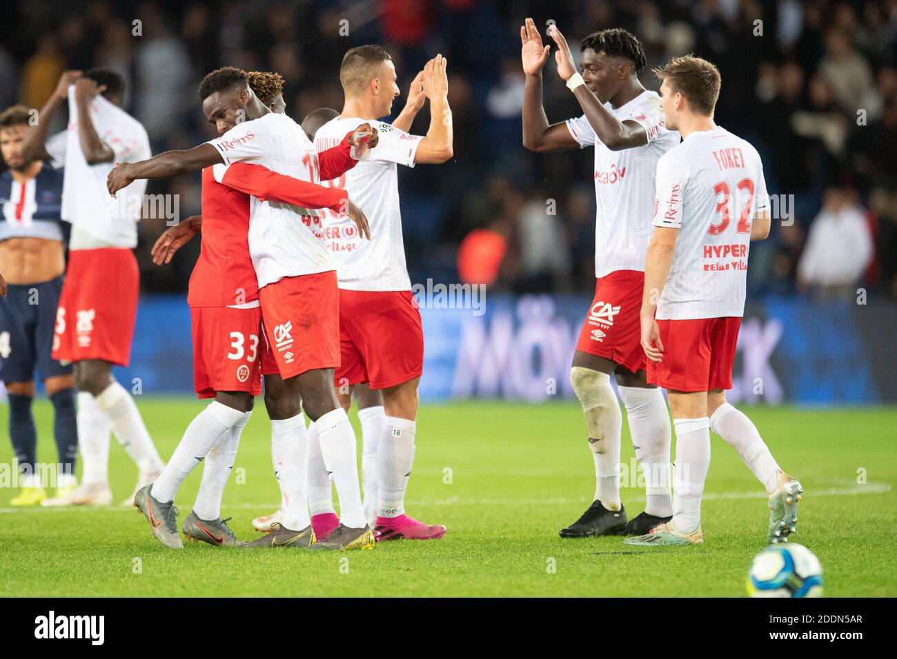 Team of Reims celebrates their victory during the Ligue 1 match between ...