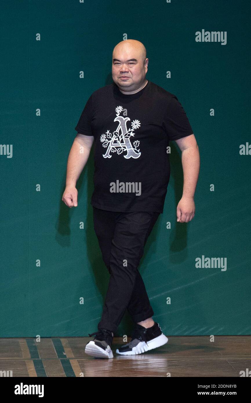 Designer Andrew GN makes an appearance on the runway during the Andrew ...