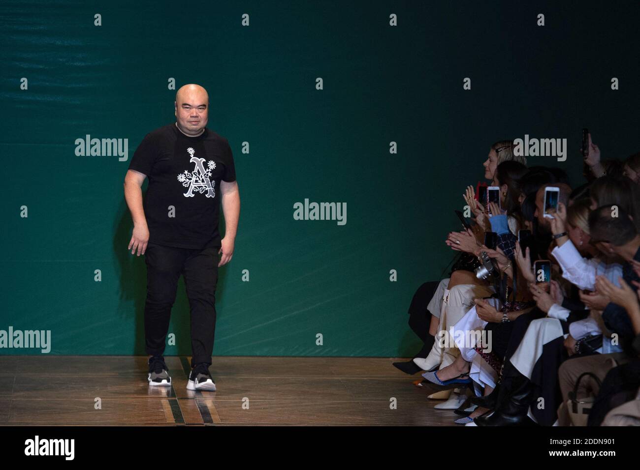 Designer Andrew GN makes an appearance on the runway during the Andrew ...