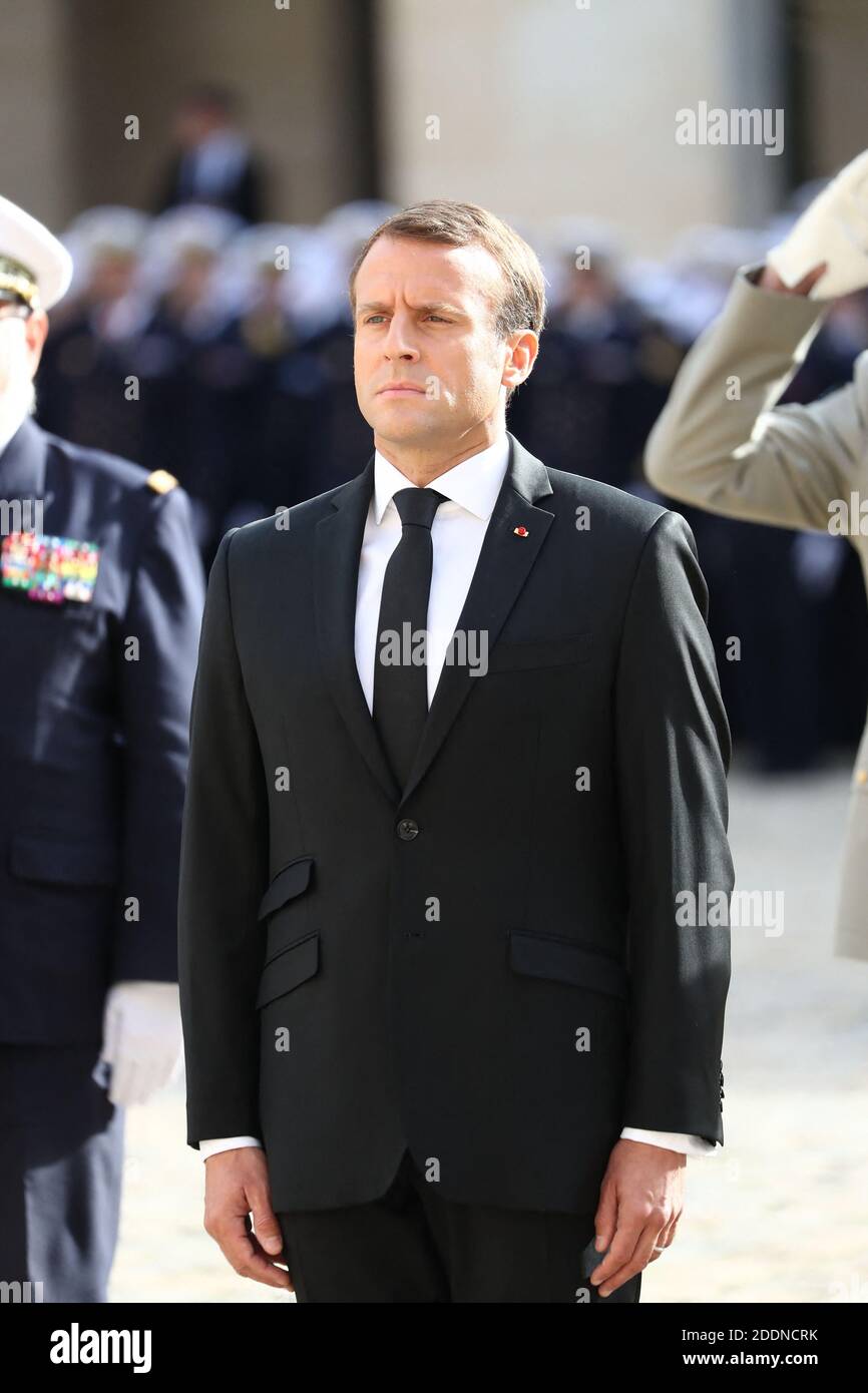 French President during the funeral honors paid to the former French ...
