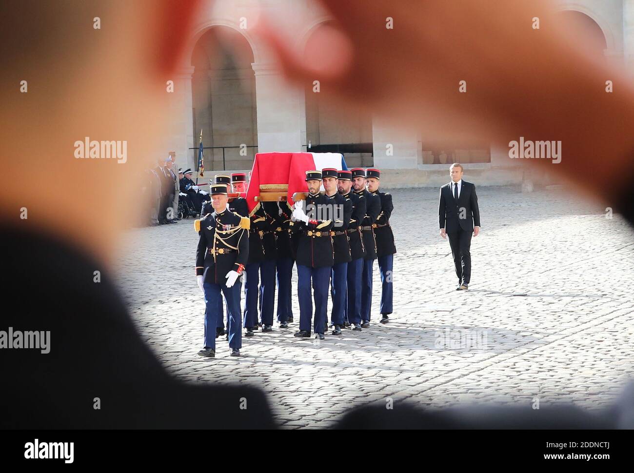 French President during the funeral honors paid to the former French ...