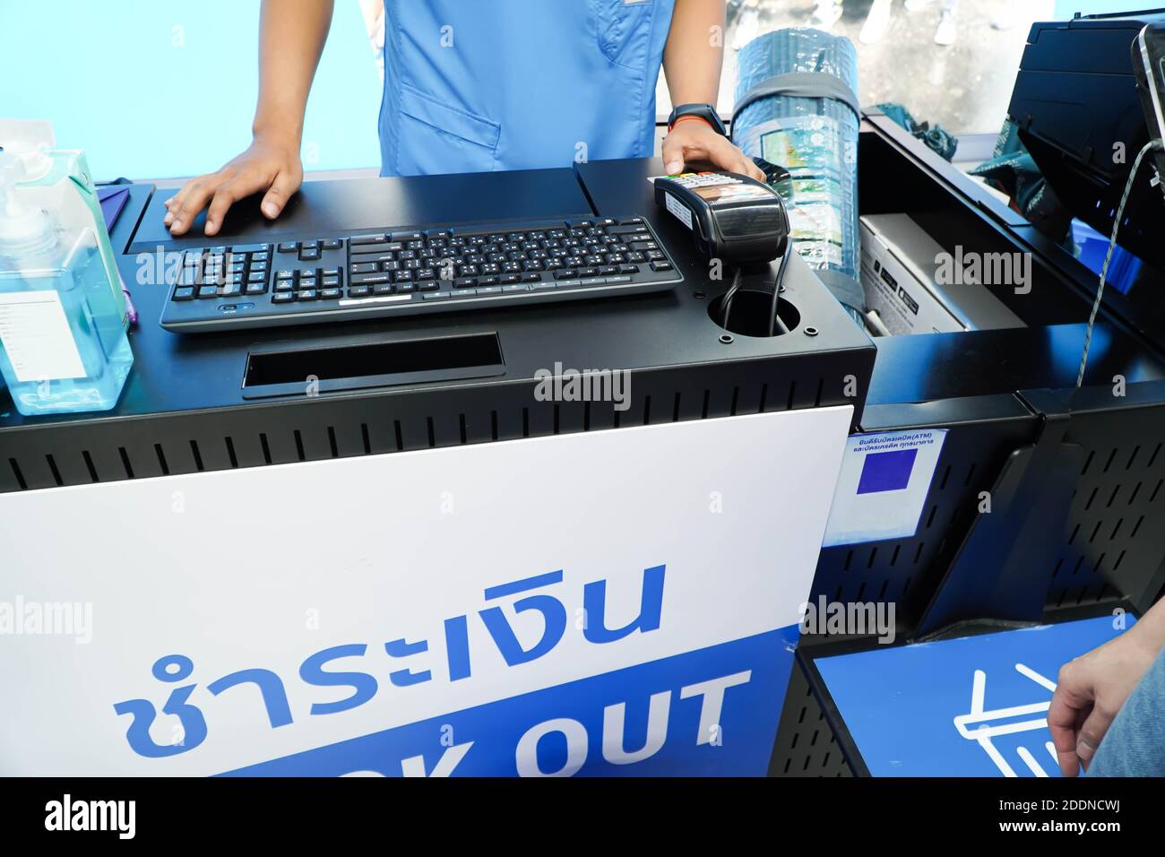 Hand holding the receipt from the credit card swipe machine .Pay with a ...