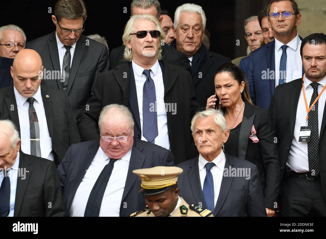 departing the funeral ceremony for former French president Jacques ...