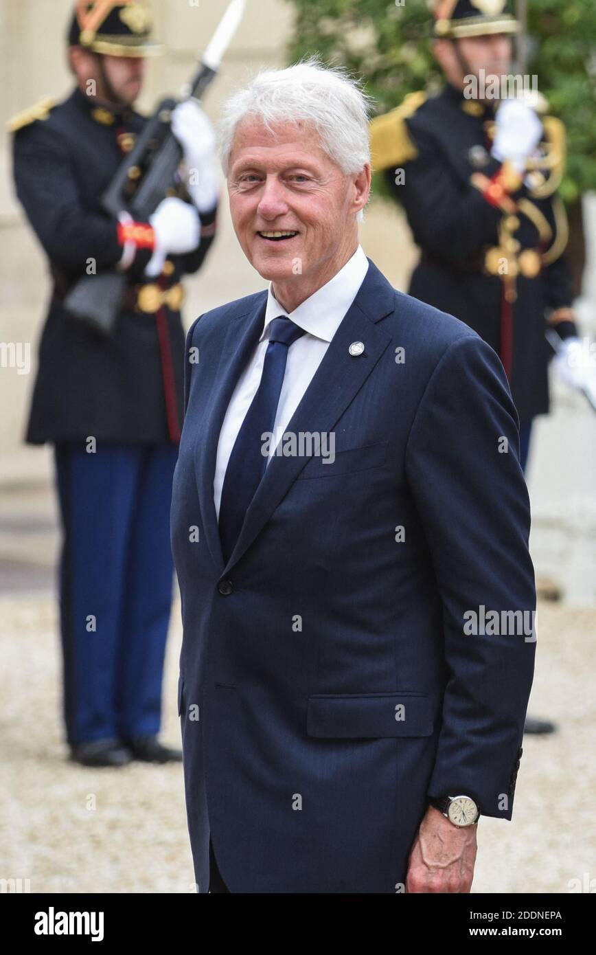 Former US President Bill Clinton arrives before a presidential lunch in ...