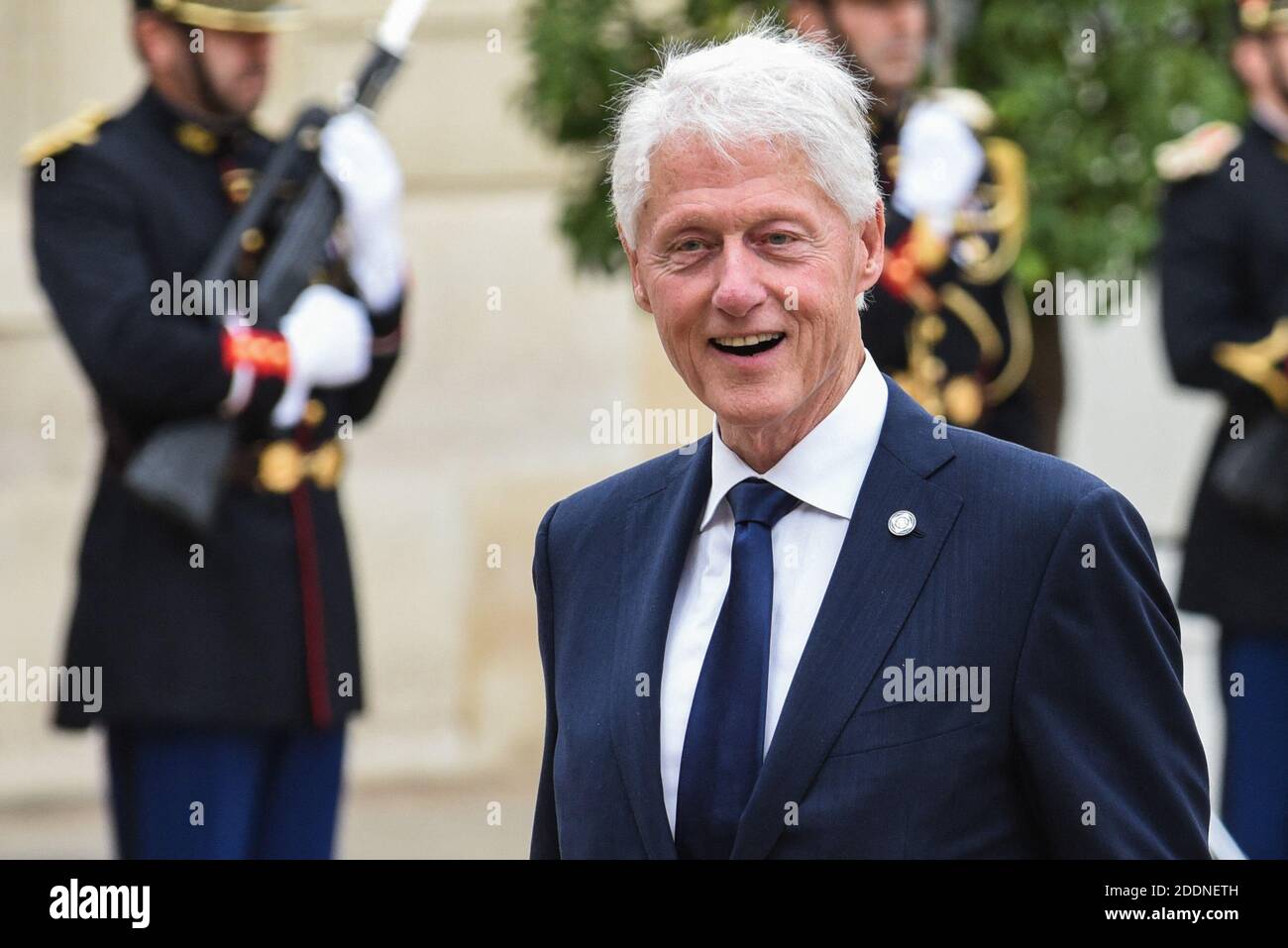 Former US President Bill Clinton arrives before a presidential lunch in ...