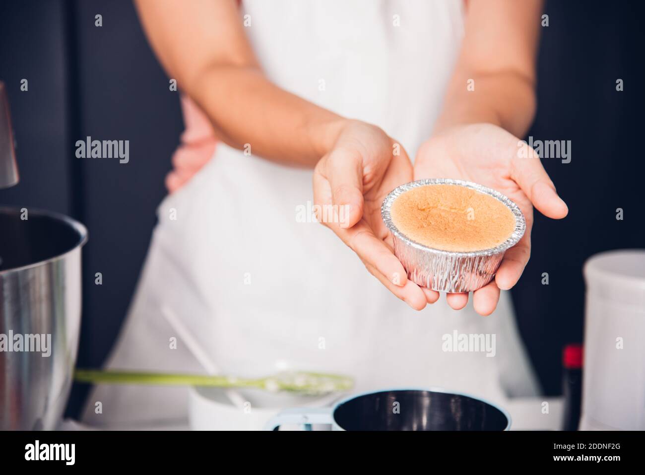 Beautiful woman show bakery cake holding on hands at homemade Stock ...