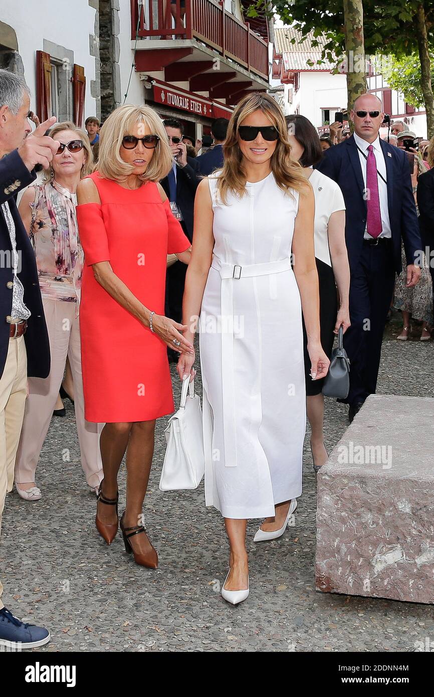 Brigitte Macron, wife of French President Emmanuel Macron, walk in the ...