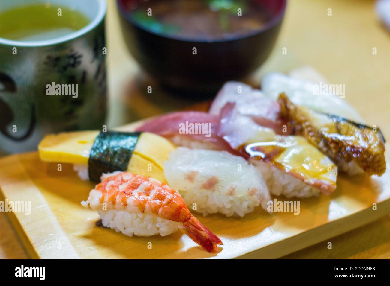 A plate of sushi inside the Kuromon Ichiban market in Osaka, Japan ...