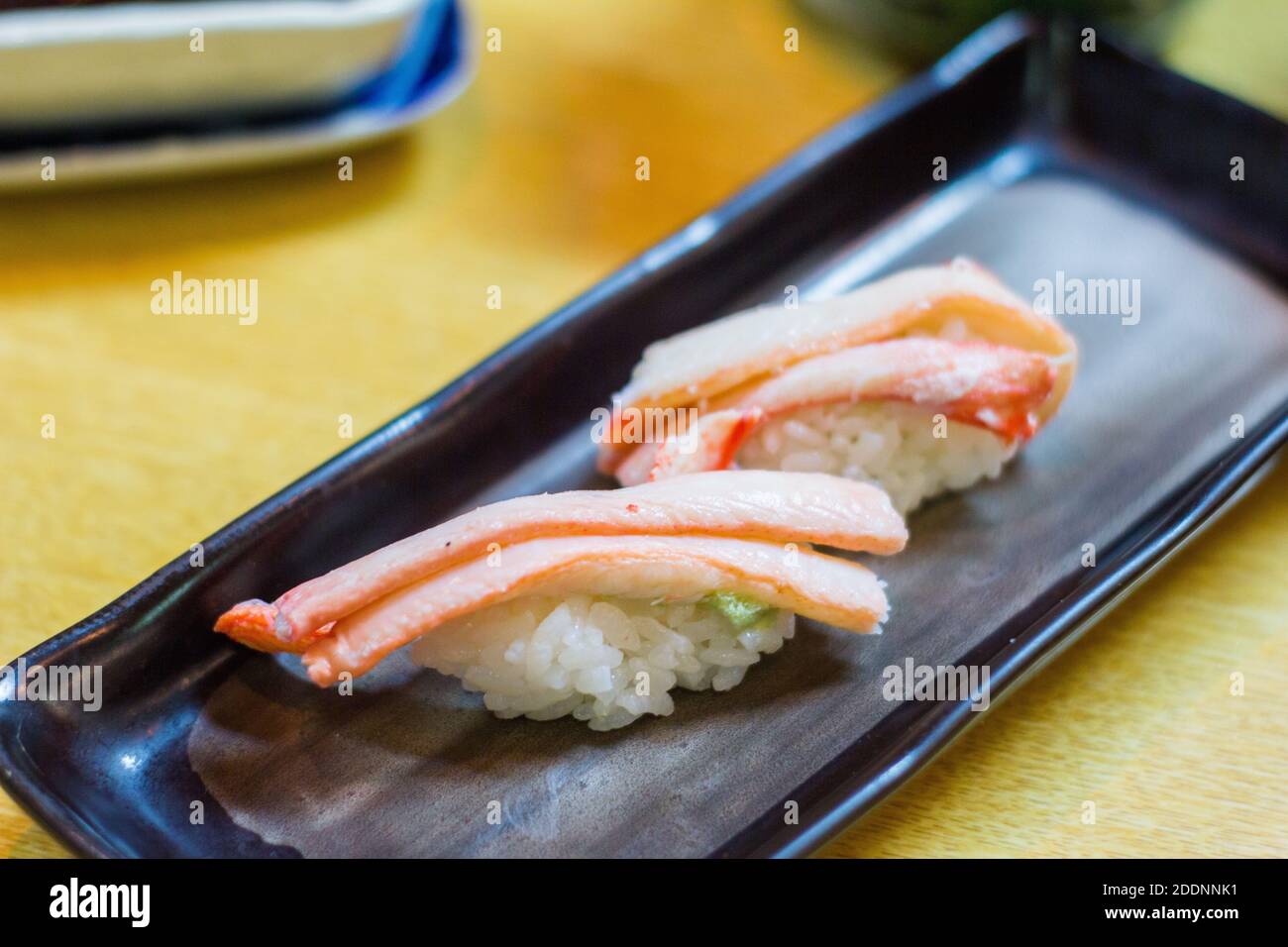 A plate of snow crab sushi inside the Kuromon Ichiban market in Osaka ...