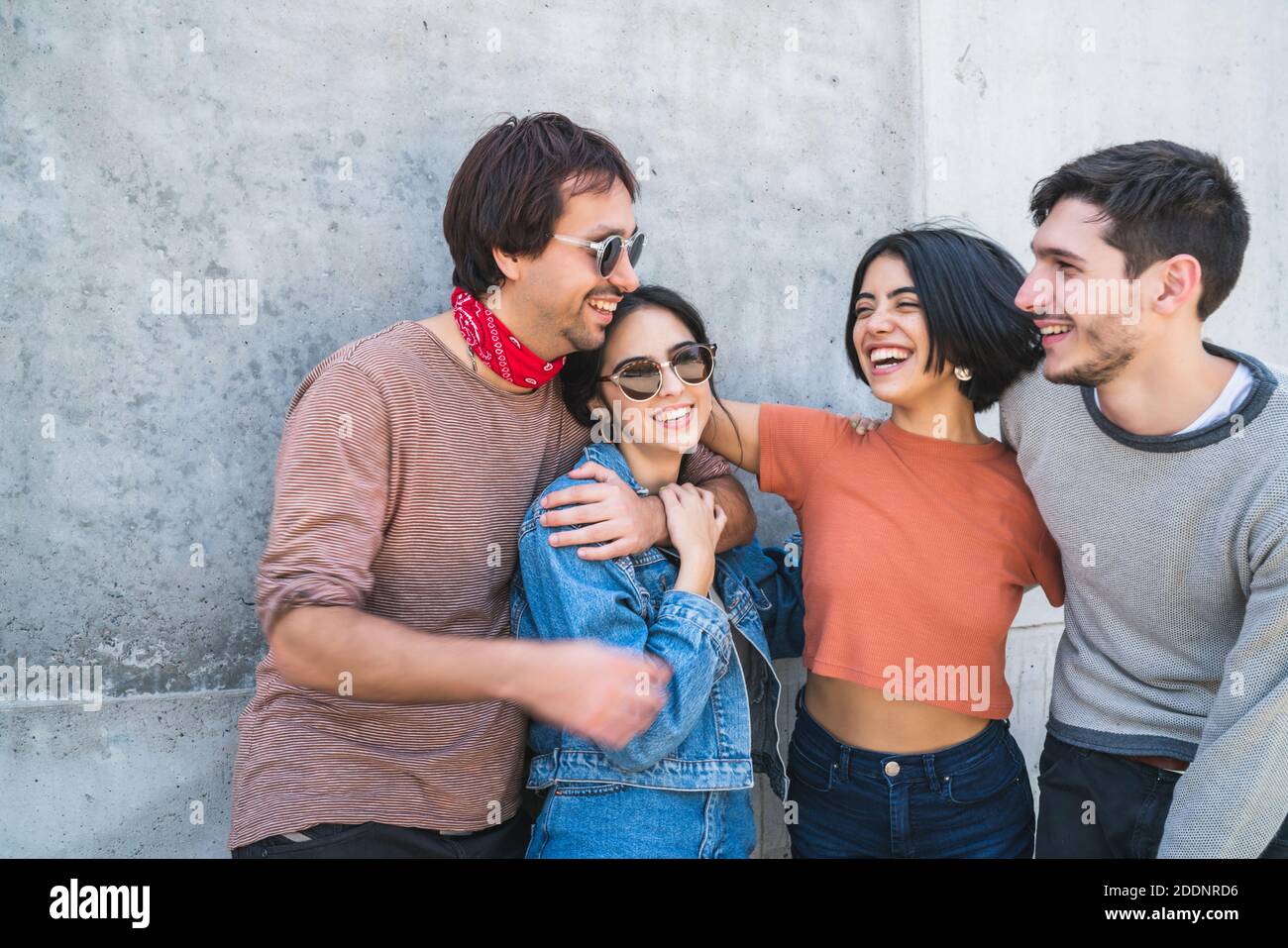 Young friends stand together hi-res stock photography and images - Alamy