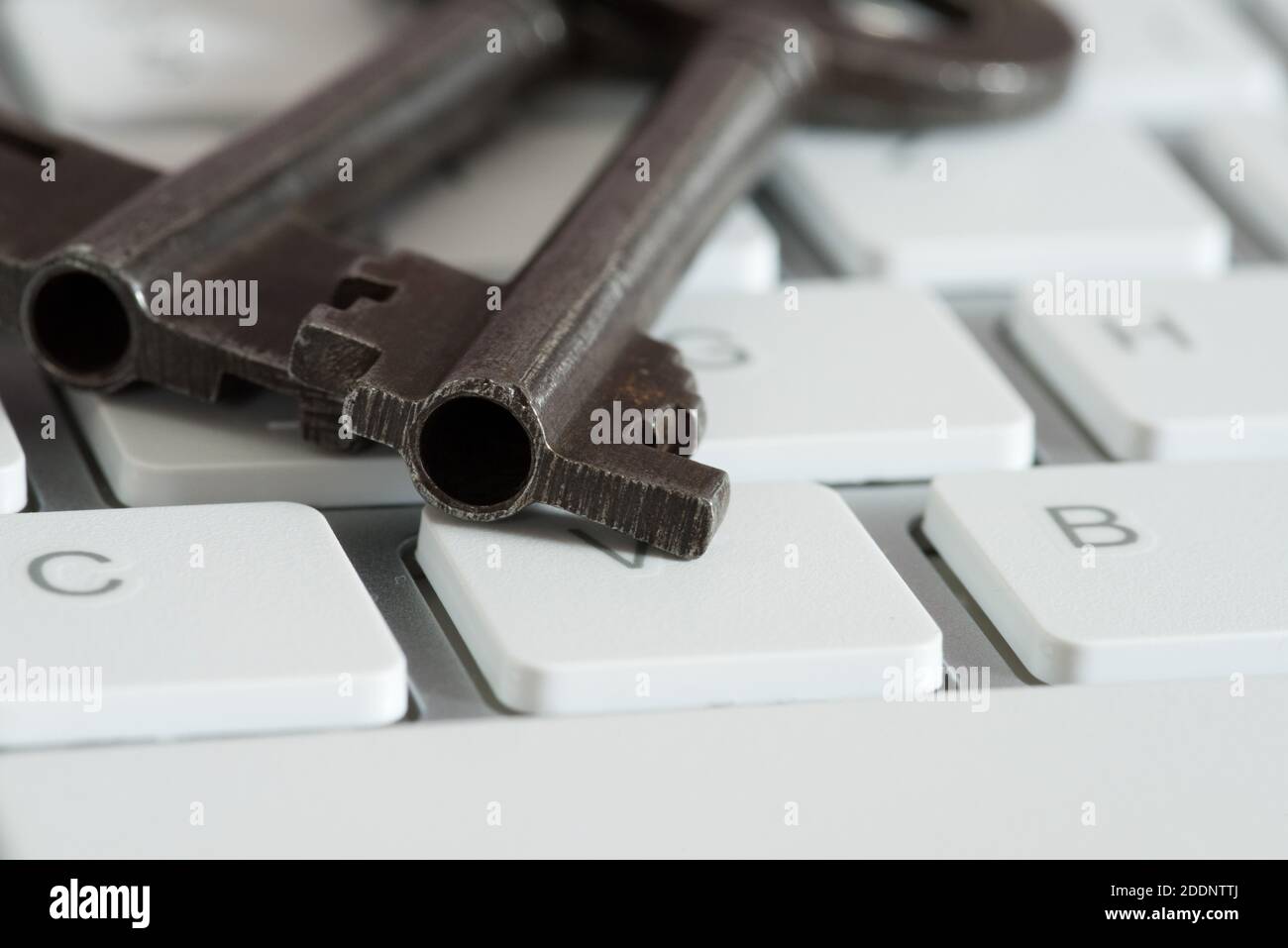Keys and a computer Stock Photo - Alamy