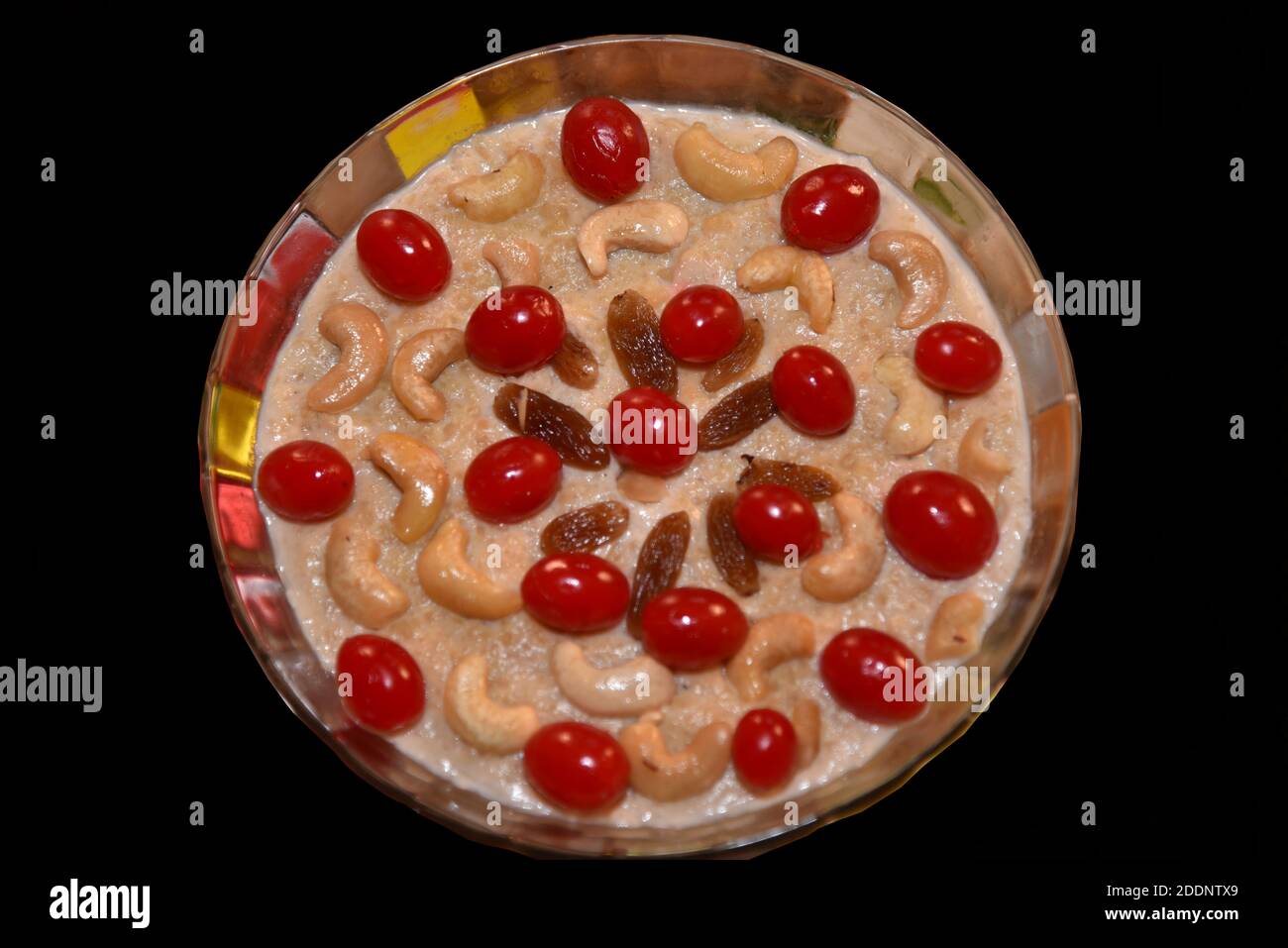 sweet rice with dry fruits, cashew, and red cherry Stock Photo - Alamy