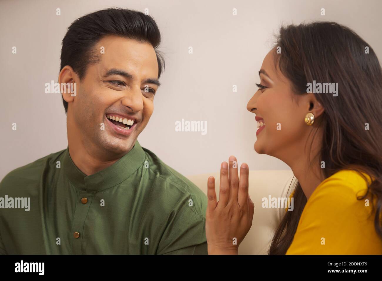 a couple sharing a light moment Stock Photo - Alamy