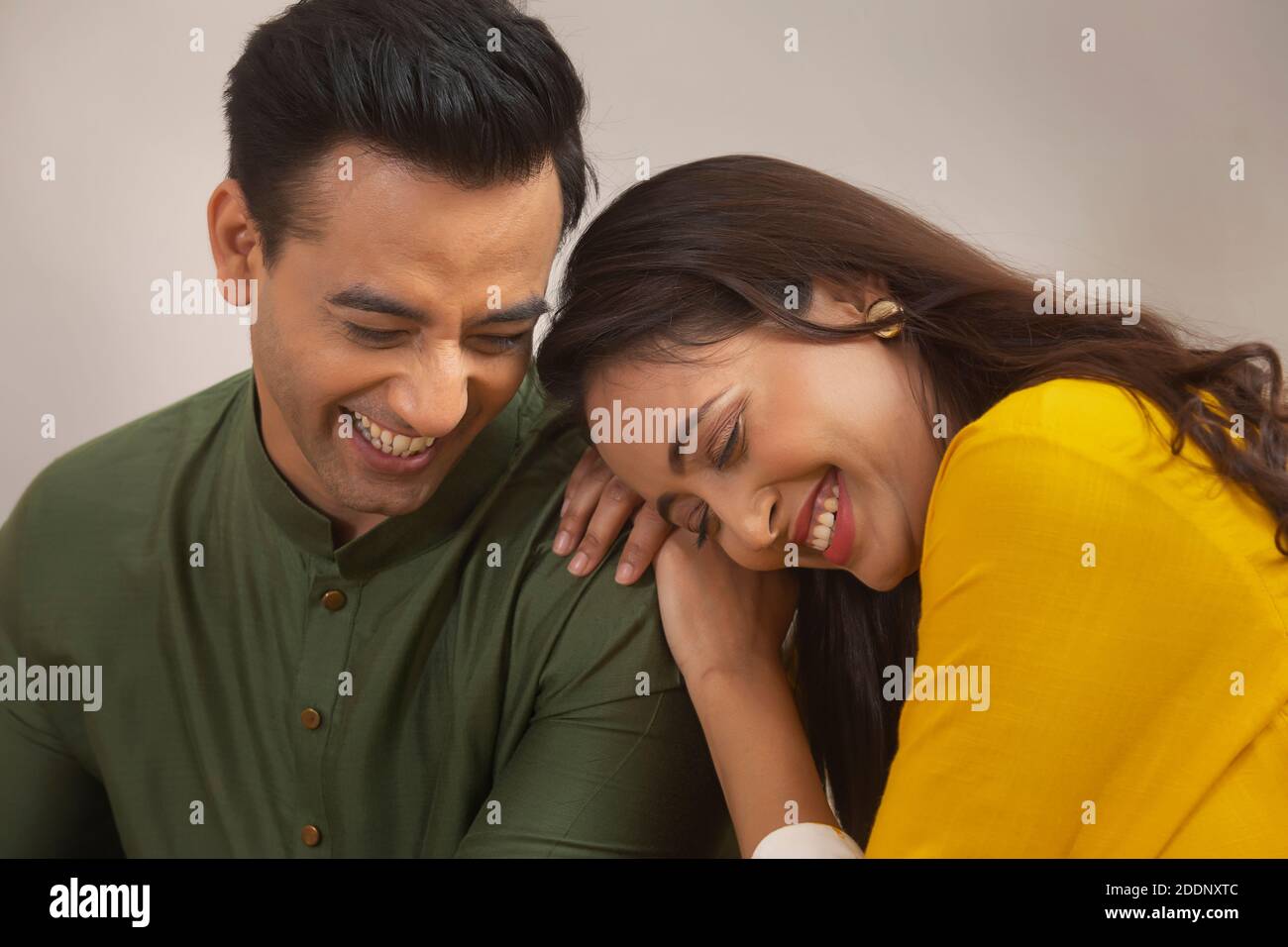 a couple sharing a light moment Stock Photo - Alamy