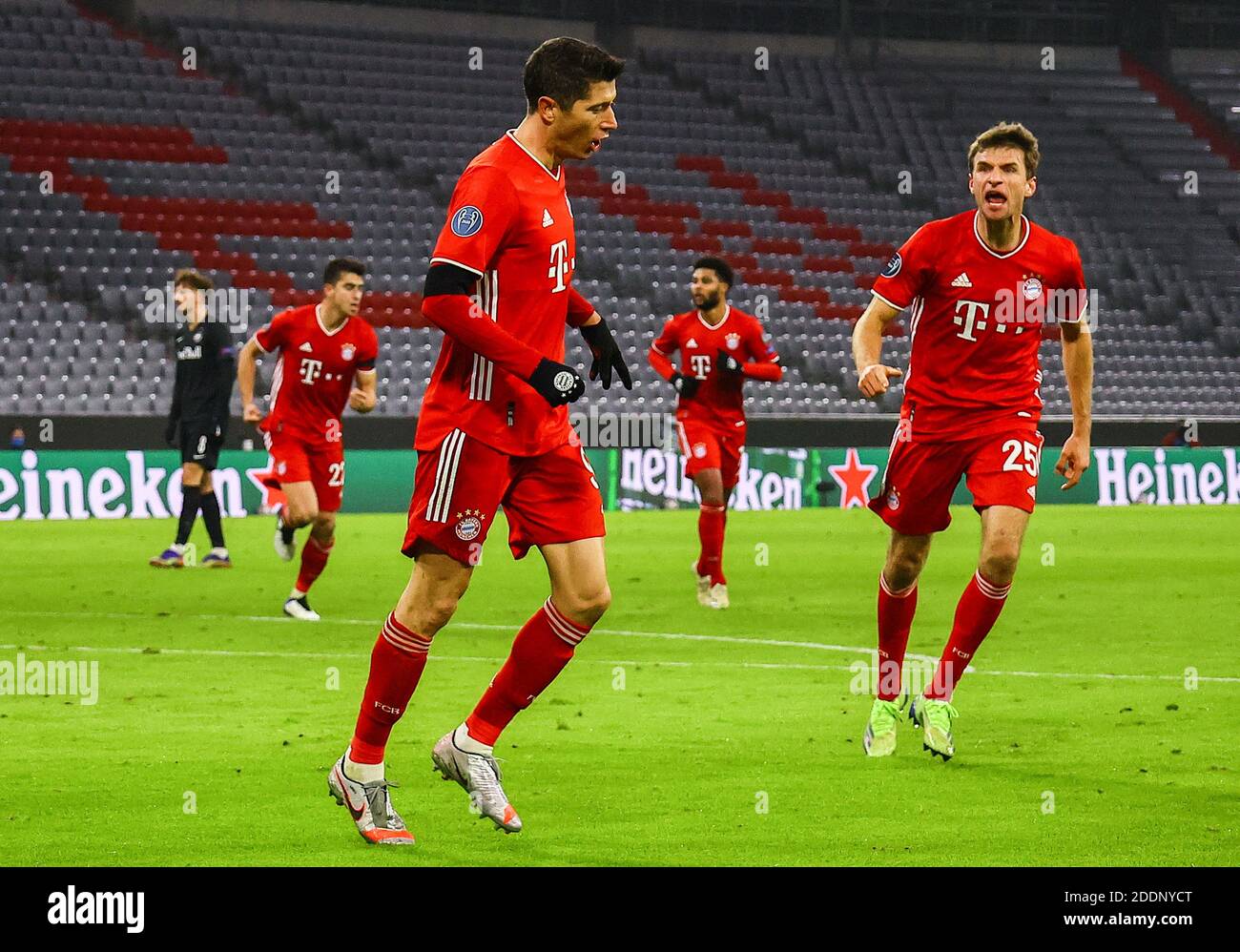Munich, Germany. 25th Nov, 2020. Robert Lewandowski (C) of Bayern ...