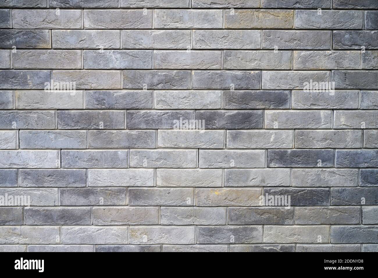 pattern of decorative gray slate stone wall surface as a background ...