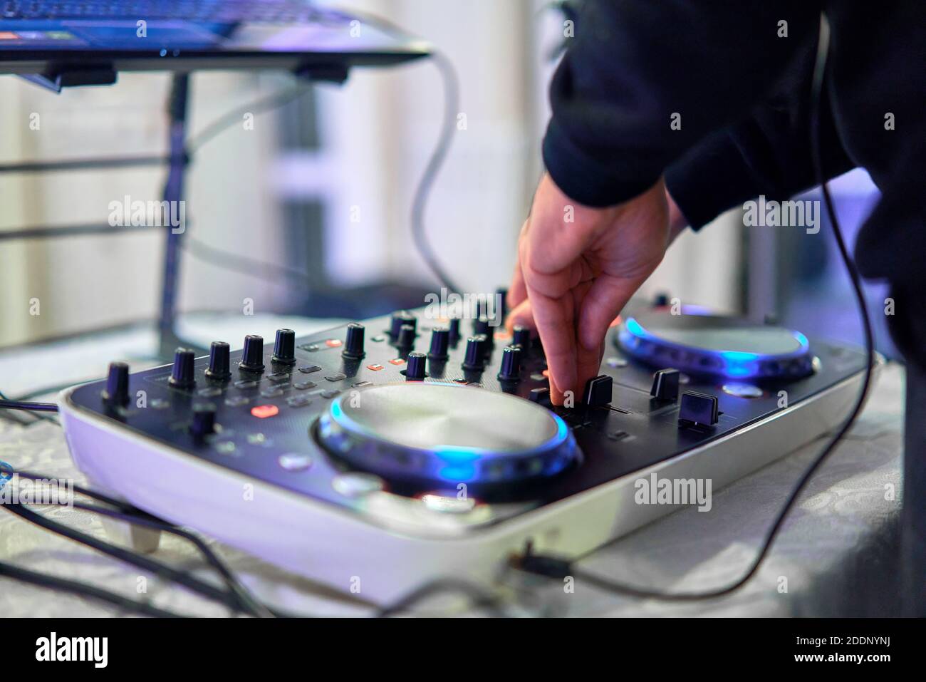remote DJ at a festive event Stock Photo - Alamy