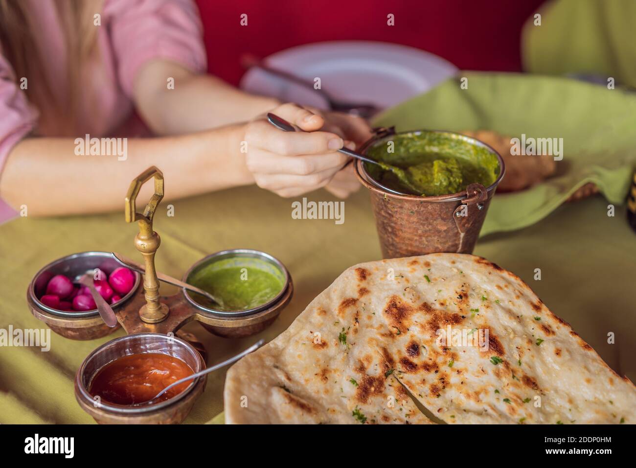Indian girl eating rice hi-res stock photography and images - Alamy