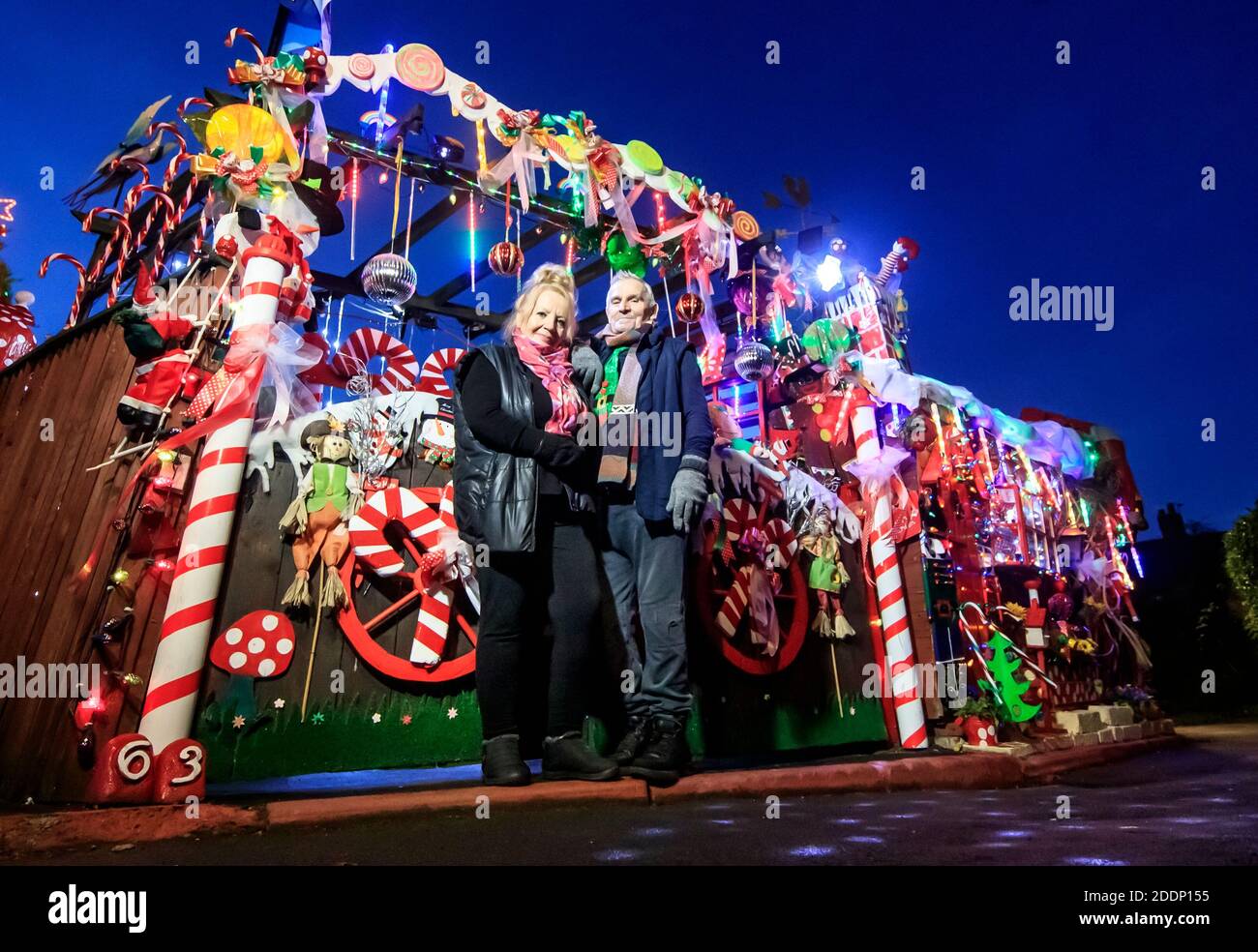 May and Rod Proctor with their candy themed Christmas decorations at ...