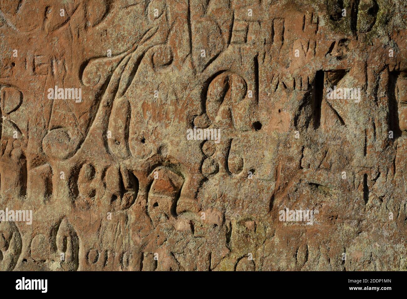 Inscriptions and drawings on the cave wall Stock Photo - Alamy