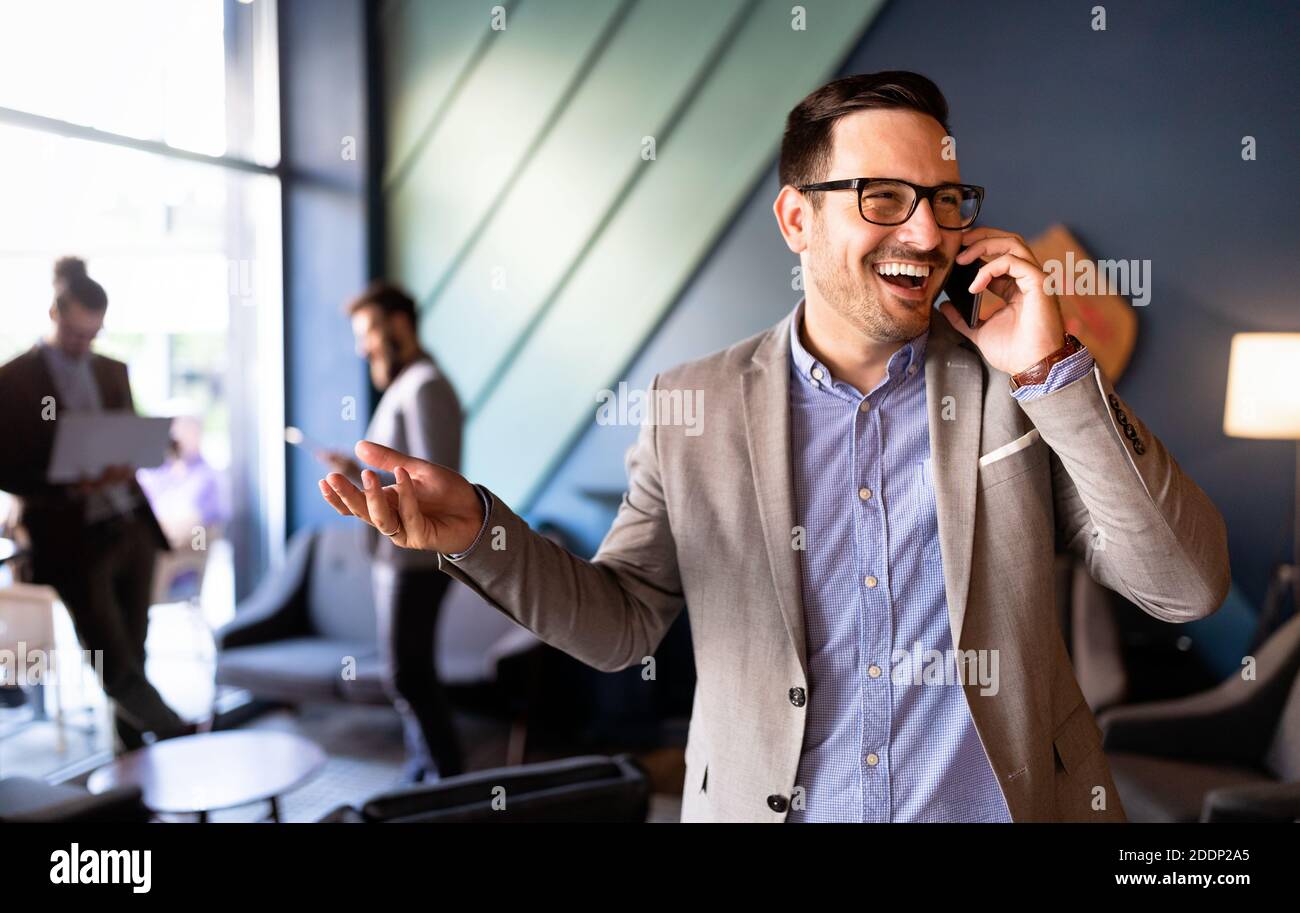 Enjoying work happy young hi-res stock photography and images - Alamy