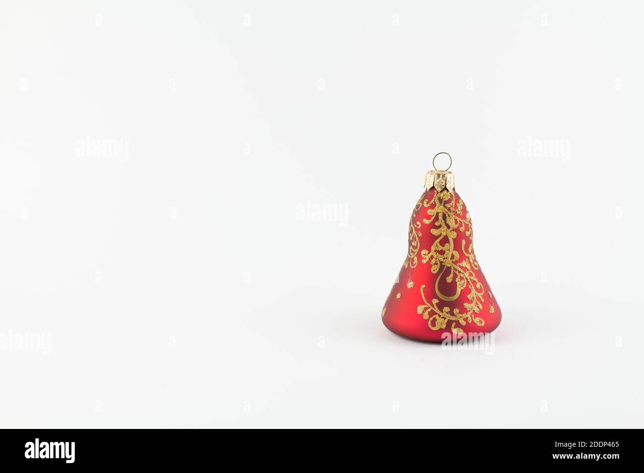 toy red ball for the christmas tree on a white Stock Photo - Alamy