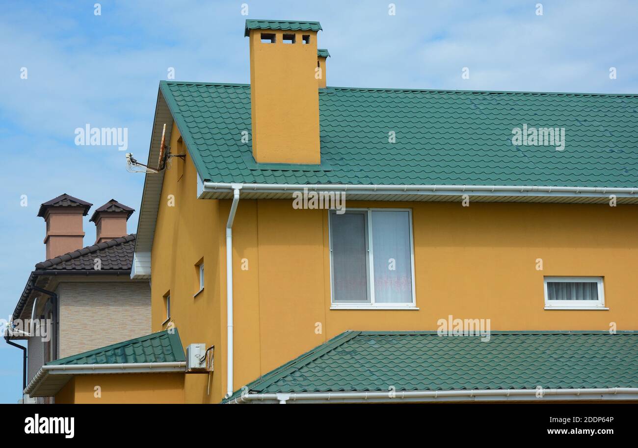 Green painted metal gutters hi-res stock photography and images - Alamy