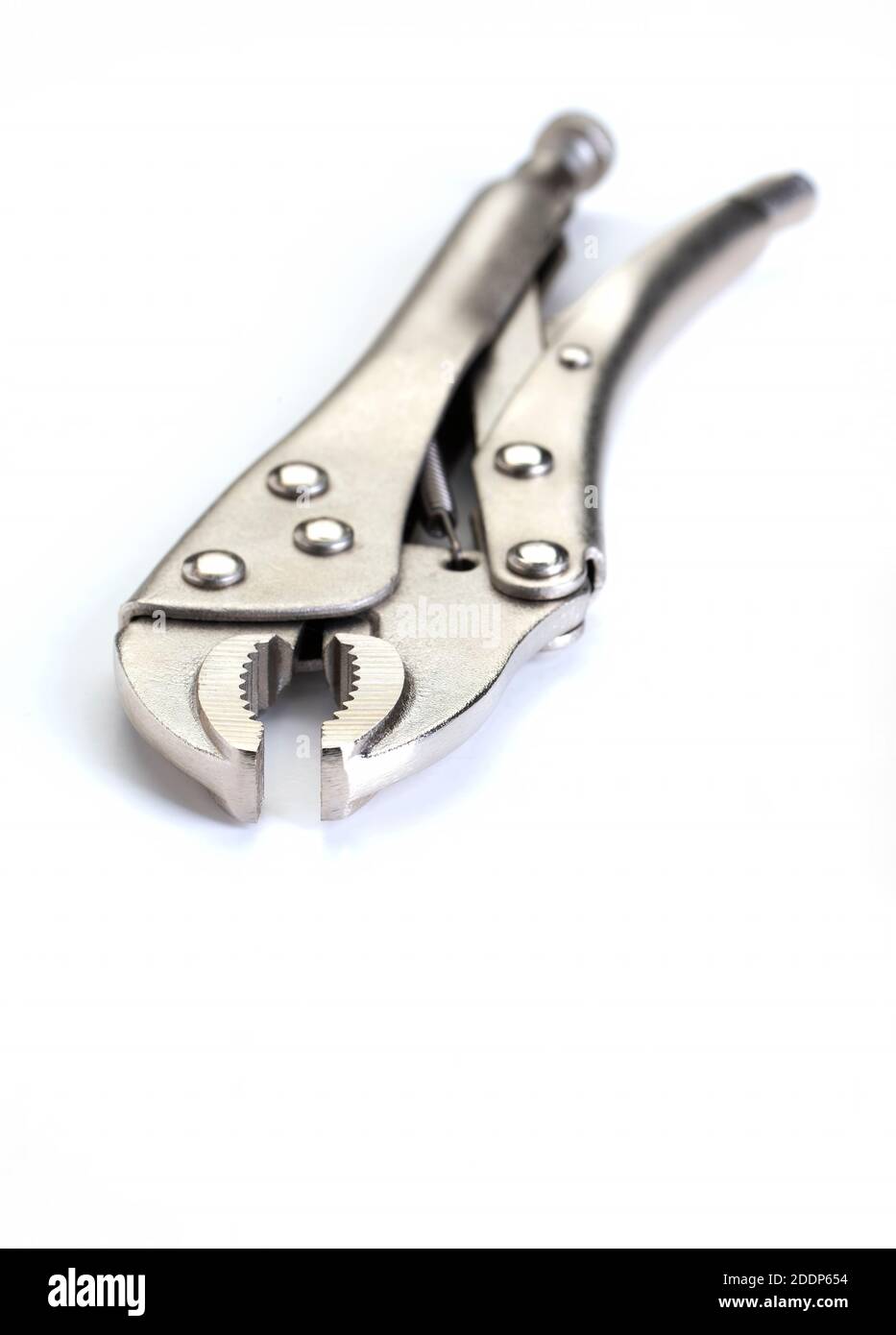 Gripping mechanic hand tool on white background Stock Photo - Alamy