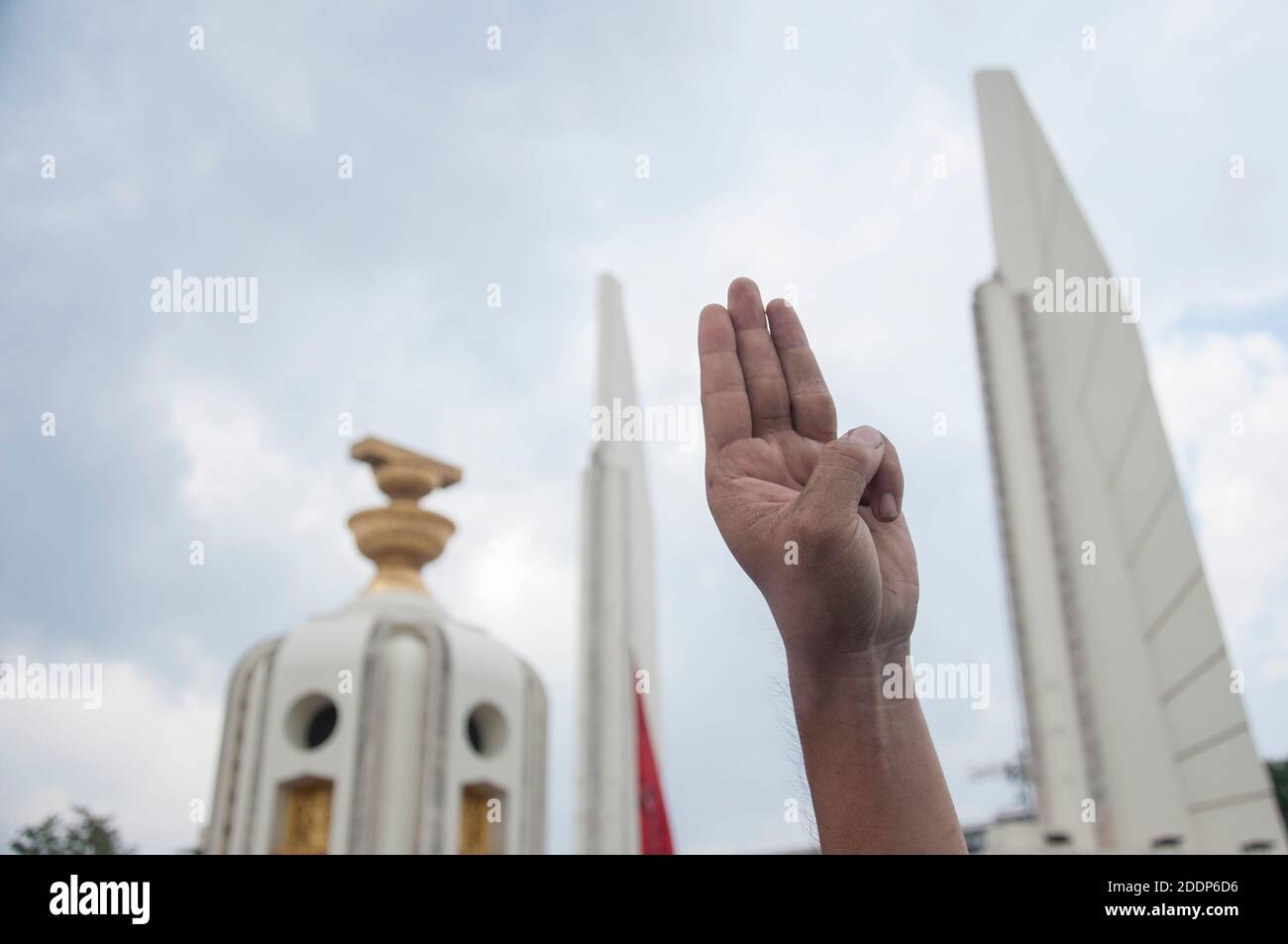 Bangkok, Thailand. 14th Oct, 2020. A protester making the three finger ...