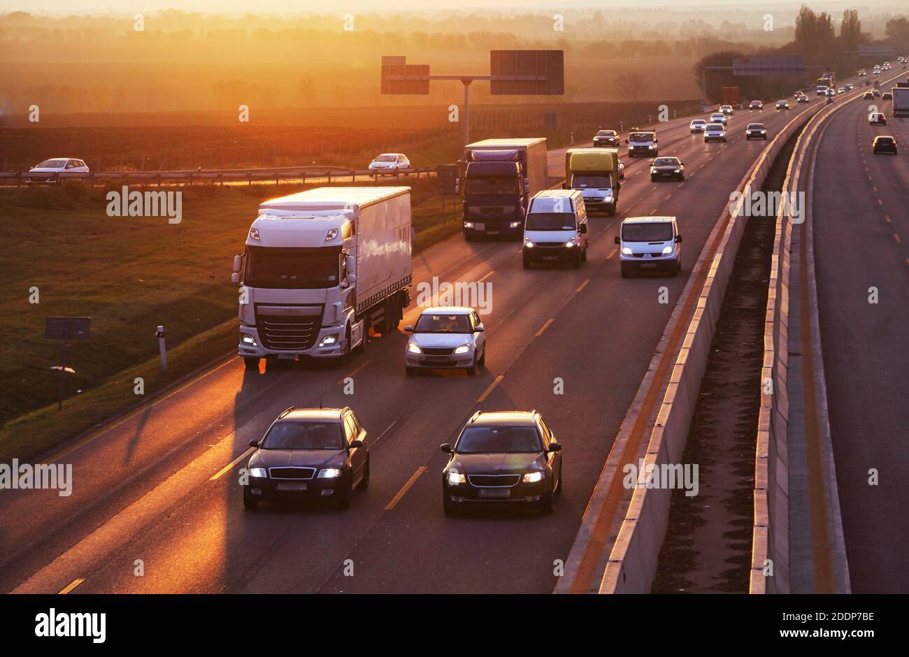 Highway transportation with cars and Truck Stock Photo - Alamy