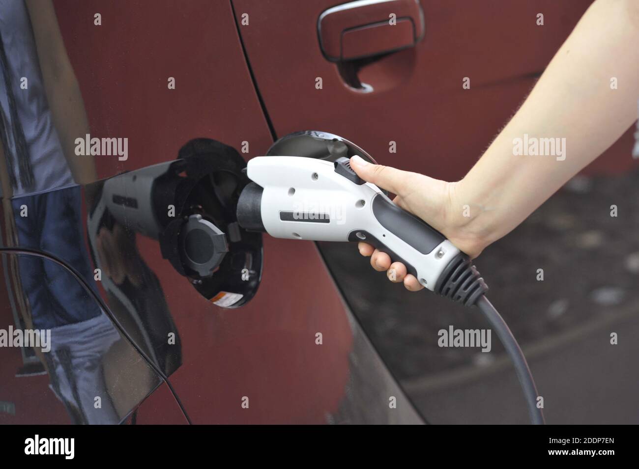 charging of an electric car at an electric filling station Stock Photo ...