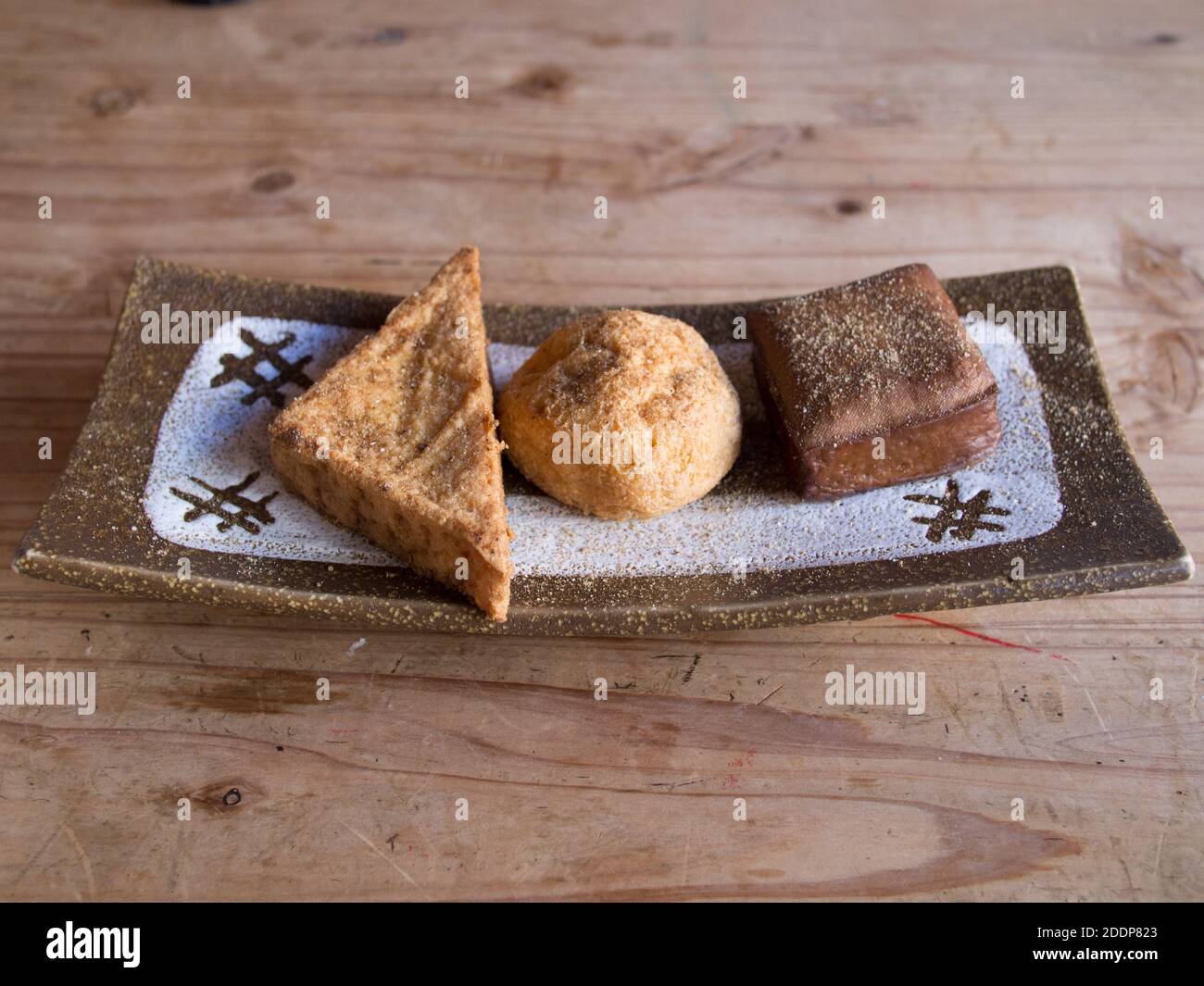 A square-shaped, a circle-shaped, and a triangle-shaped tofu on a ...