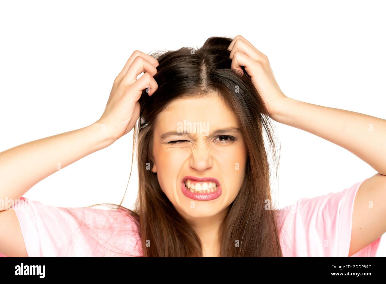 Girl scratching her head hi-res stock photography and images - Alamy