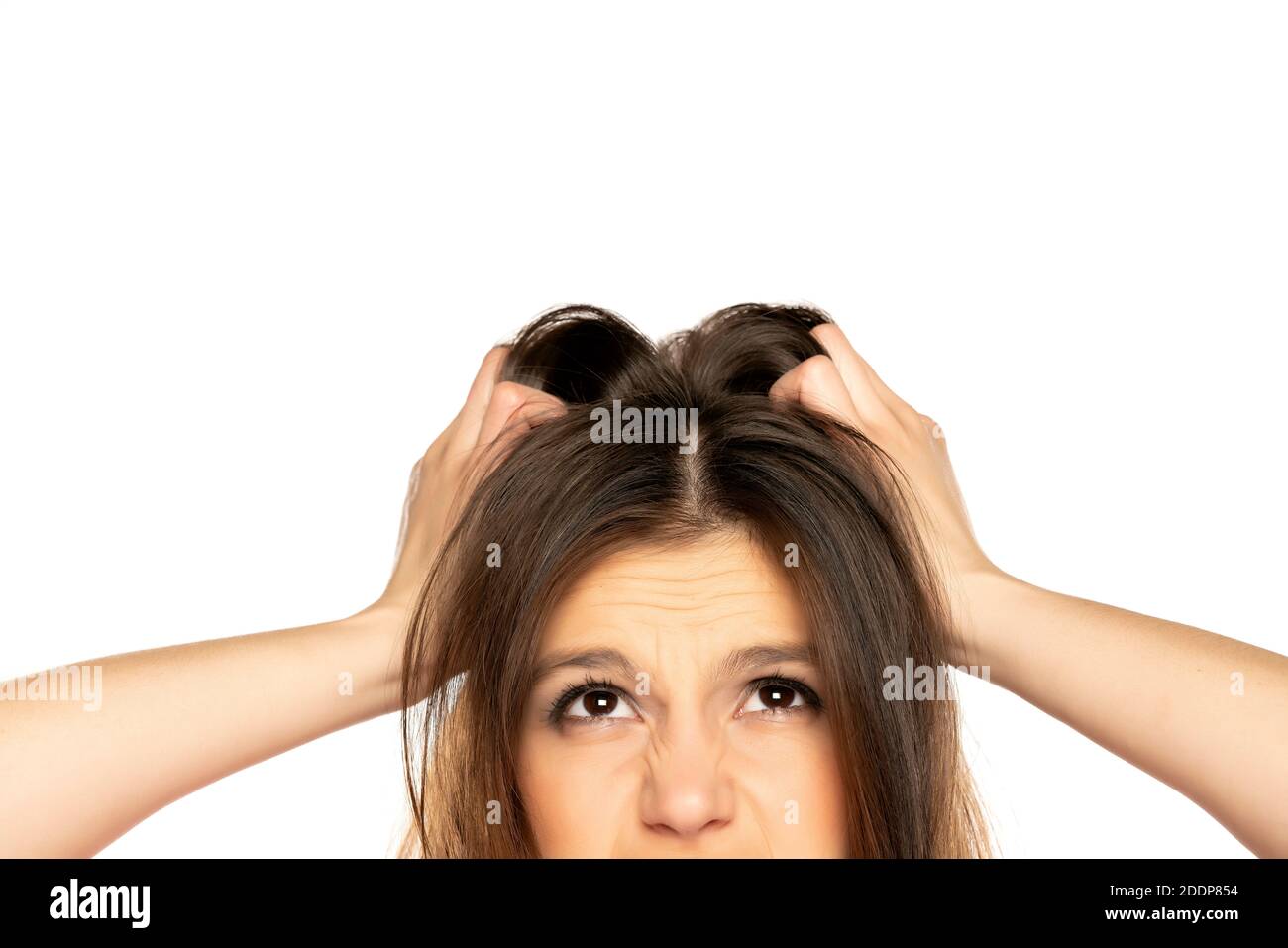 Woman scratching head hi-res stock photography and images - Alamy