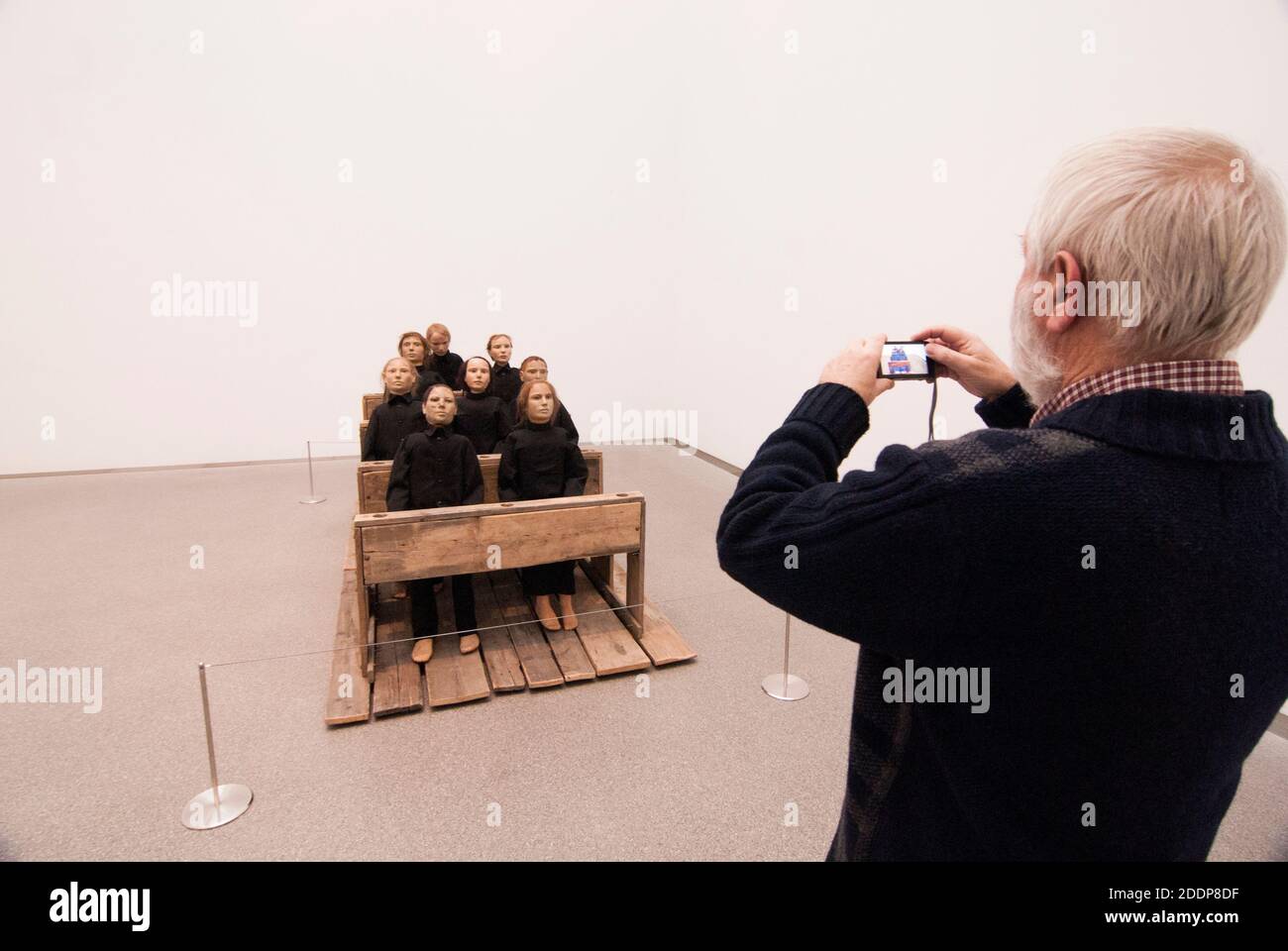 A man photographs an art installation Stock Photo - Alamy