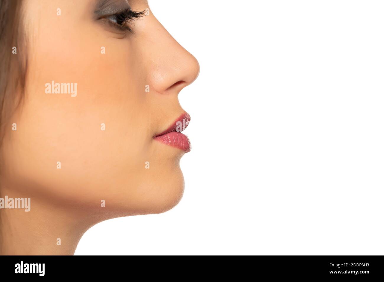 closeup profile of young beautiful woman on white background Stock ...