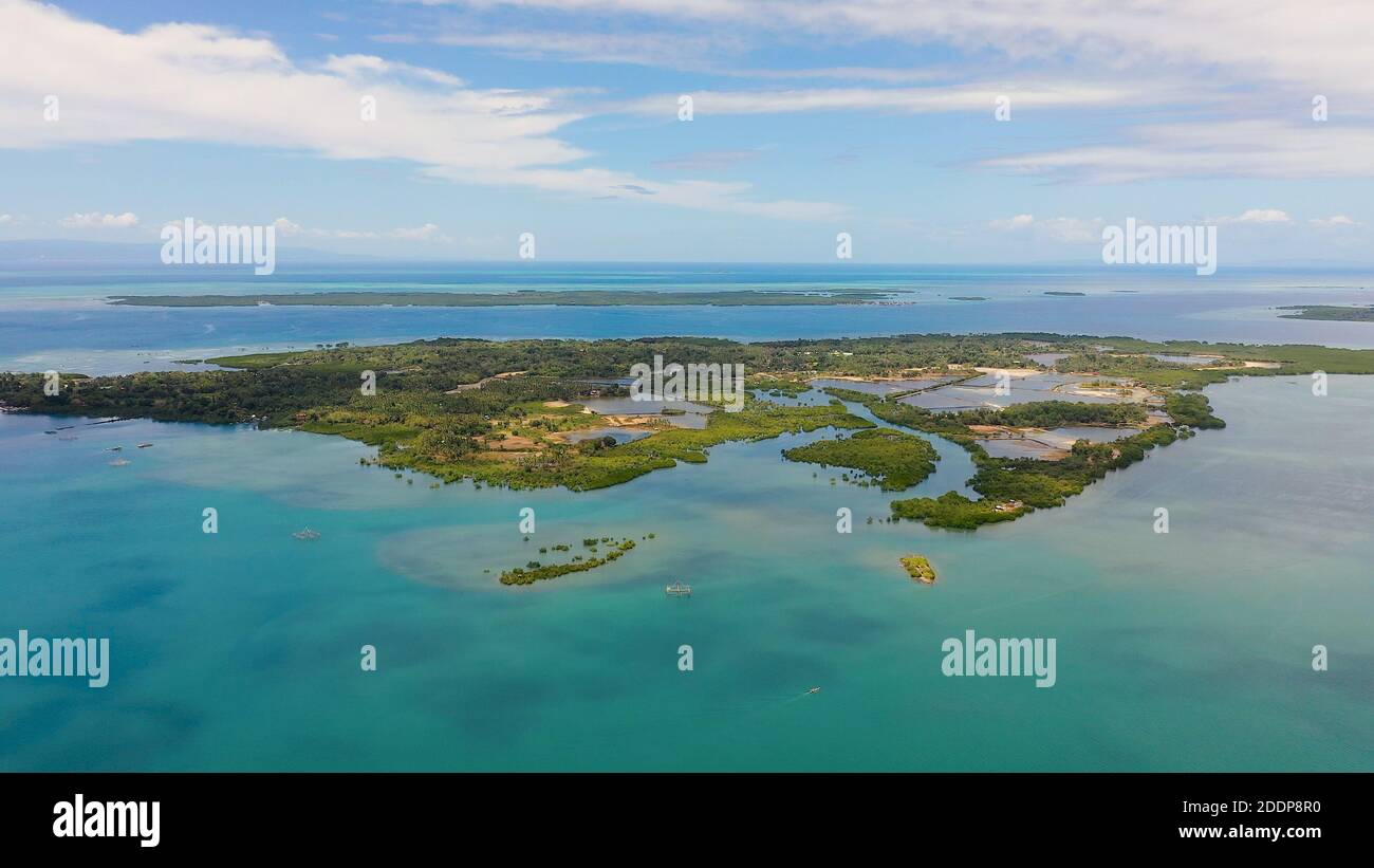 Aerial seascape: Tropical Islands and blue sea against the sky with ...