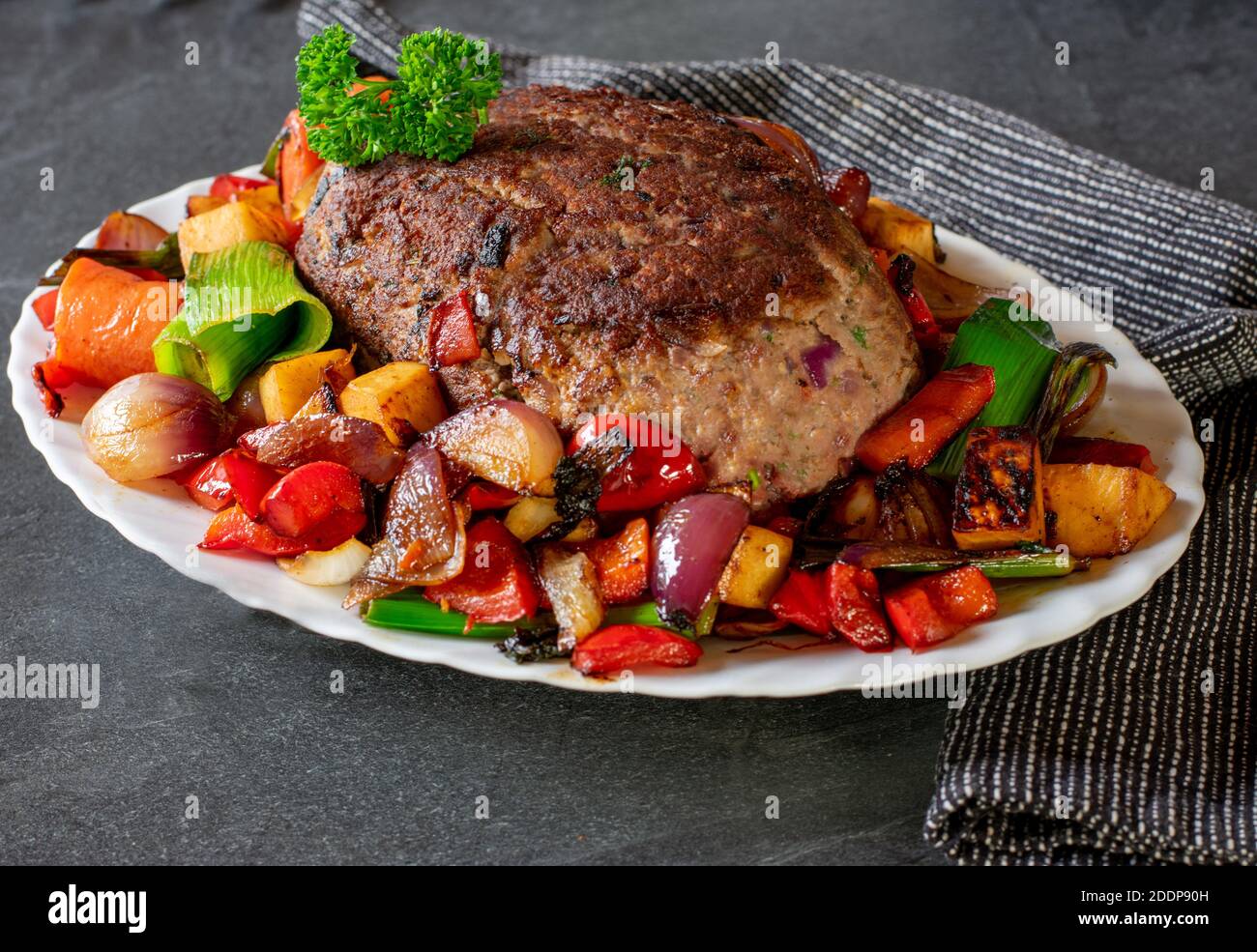 Italian Meatloaf with roasted vegetables Stock Photo - Alamy