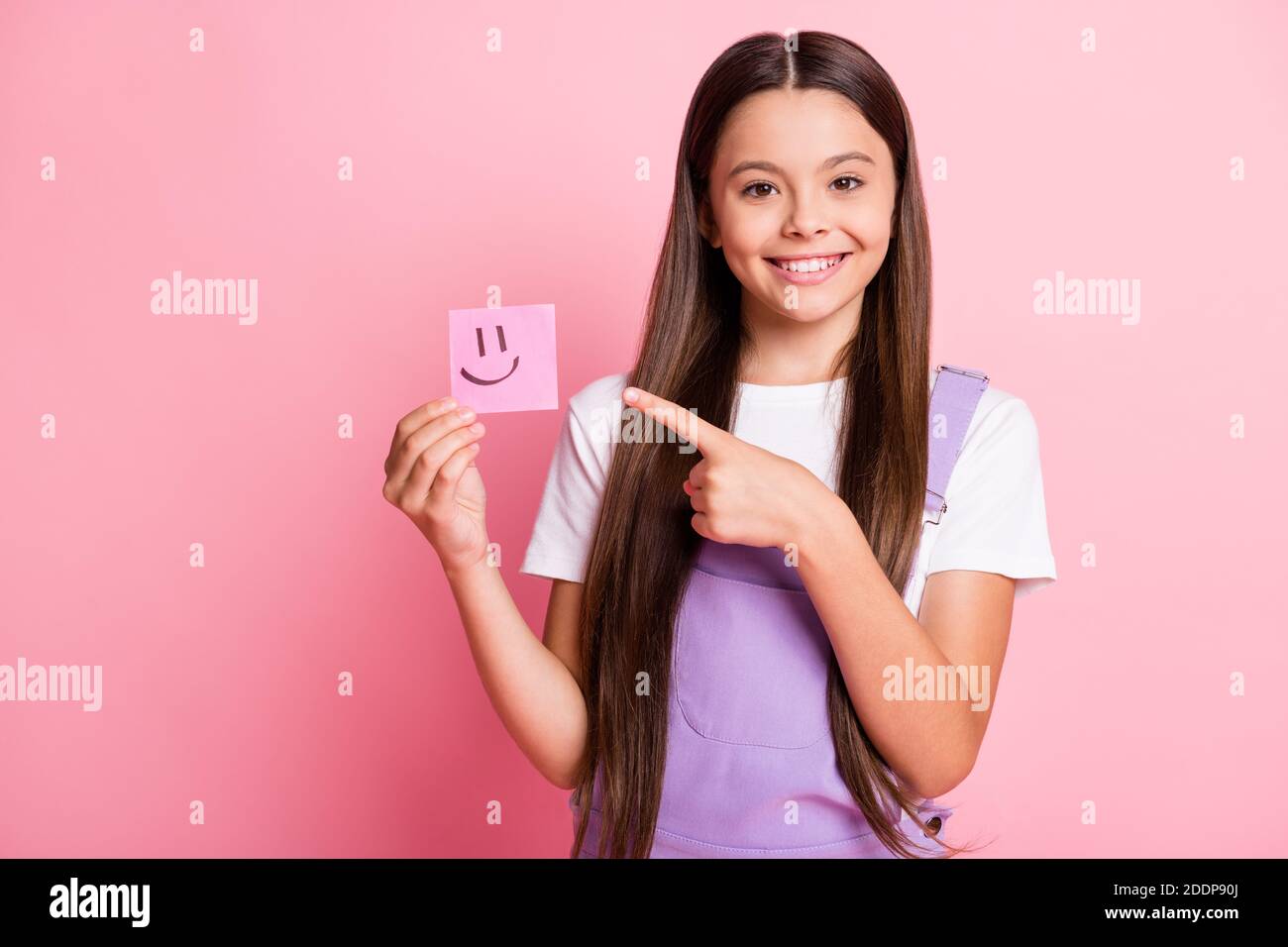 Photo of positive kid girl point finger happy emoticon sticker wear ...